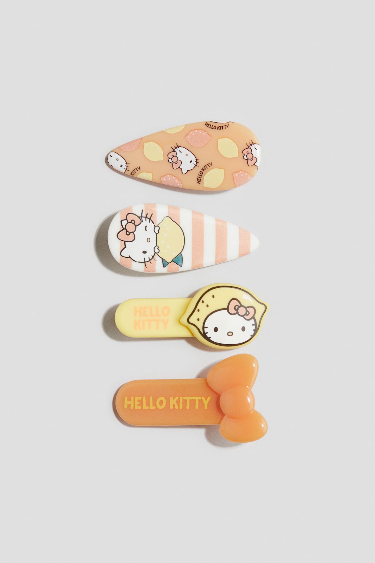 Yellow/Hello Kitty 4-Pack Hair Clips for kids | H&M US