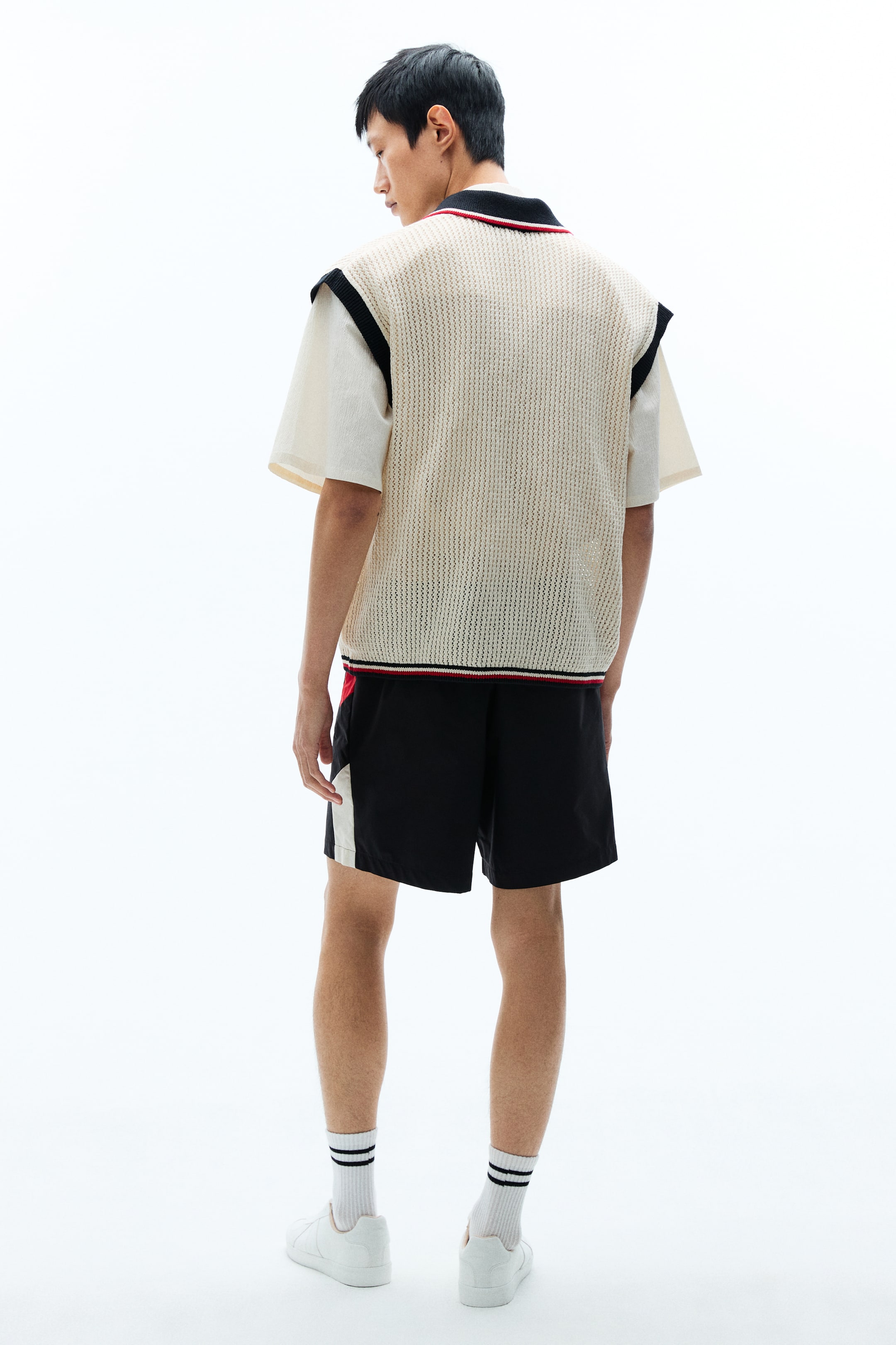 Loose Fit Textured-knit vest - Light beige/Colour block - Men | H&M SG