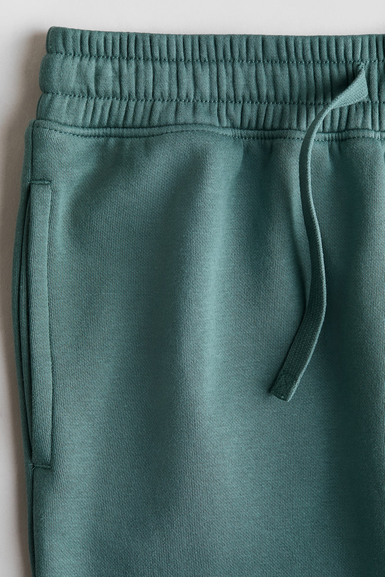 Pantalon de jogging en coton - Vert foncé - Kids | H&M CA