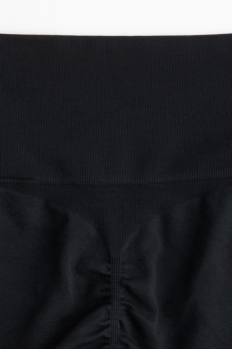 Dikişsiz Kısa Tayt Invisible Scrunch DryMove™ - Siyah - KADIN | H&M TR