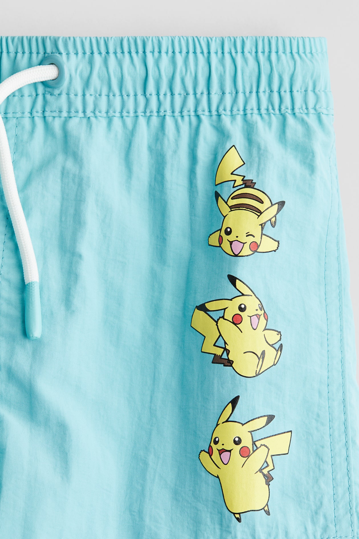 Turquoise/Pokémon Printed swim shorts for kids | H&M GB