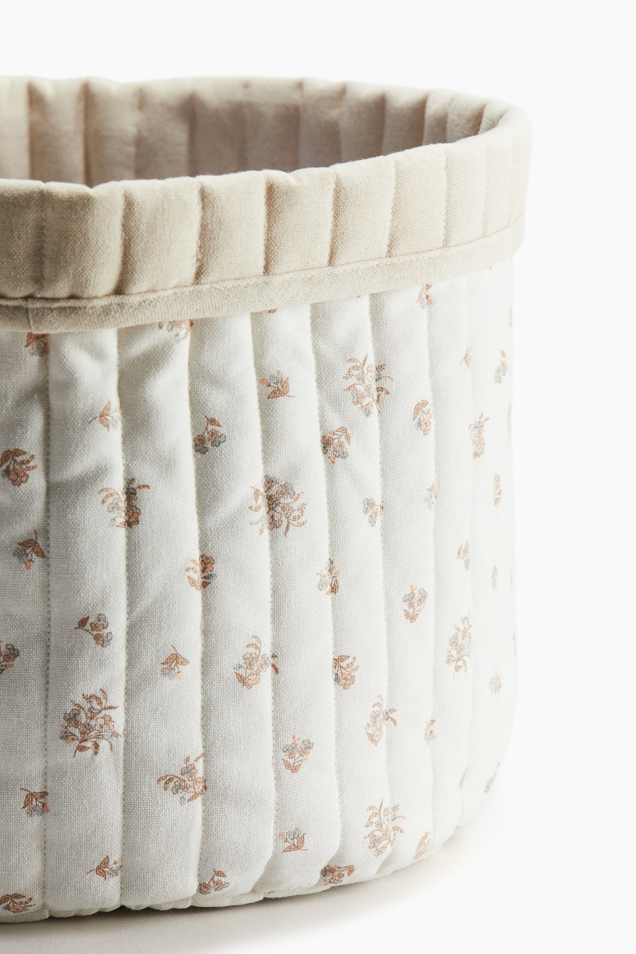 Light beige/floral Large Quilted Storage Basket at H&M Home | H&M US