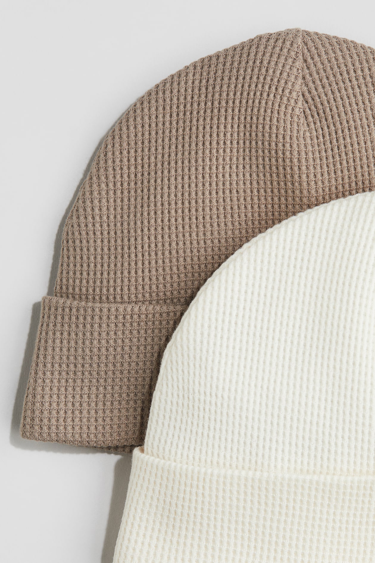 Pack de 2 gorros beanie de algodón - Beige oscuro/Crema - NIÑOS | H&M ES