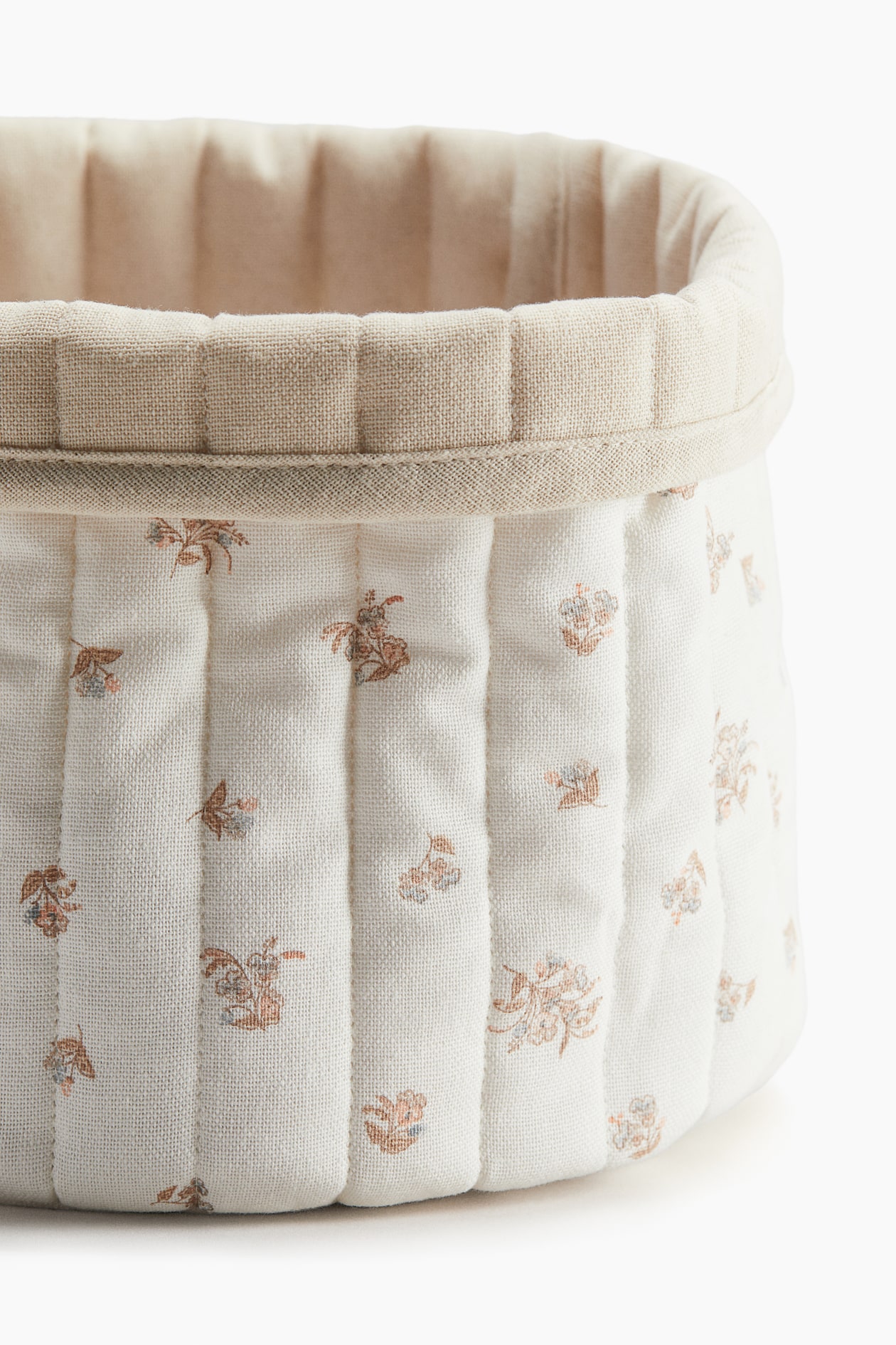 Light beige/floral Small Quilted Storage Basket at H&M Home | H&M US