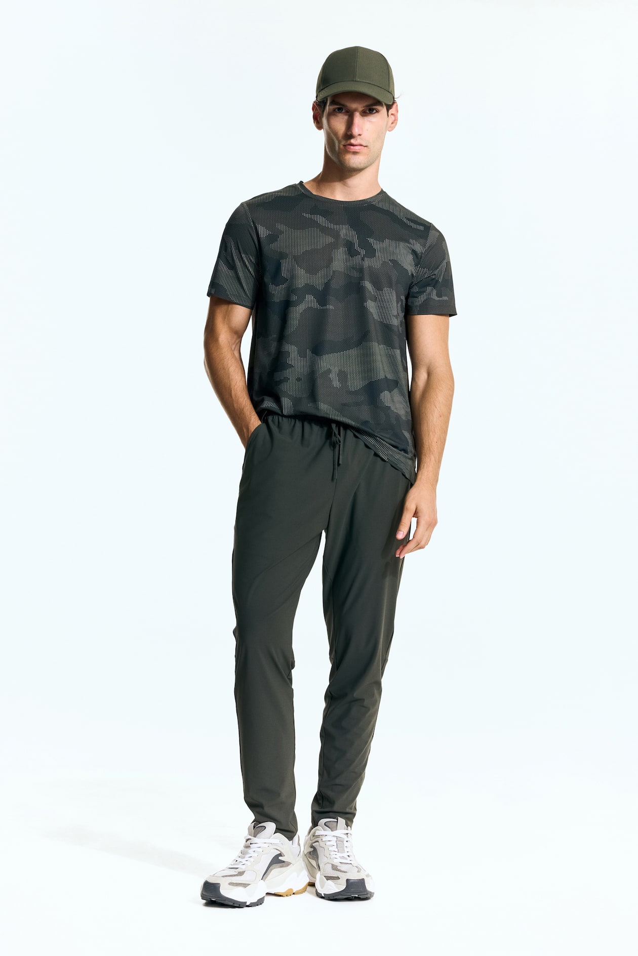 Men’s Olive green Slim Fit Sports trousers with DryMove™ | H&M IN