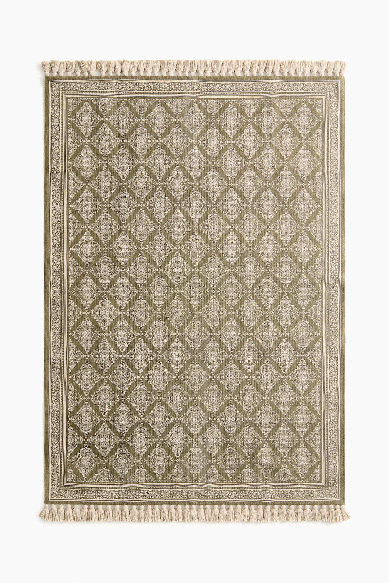 Fringed patterned rug - Khaki green/Patterned - Home All | H&M GB