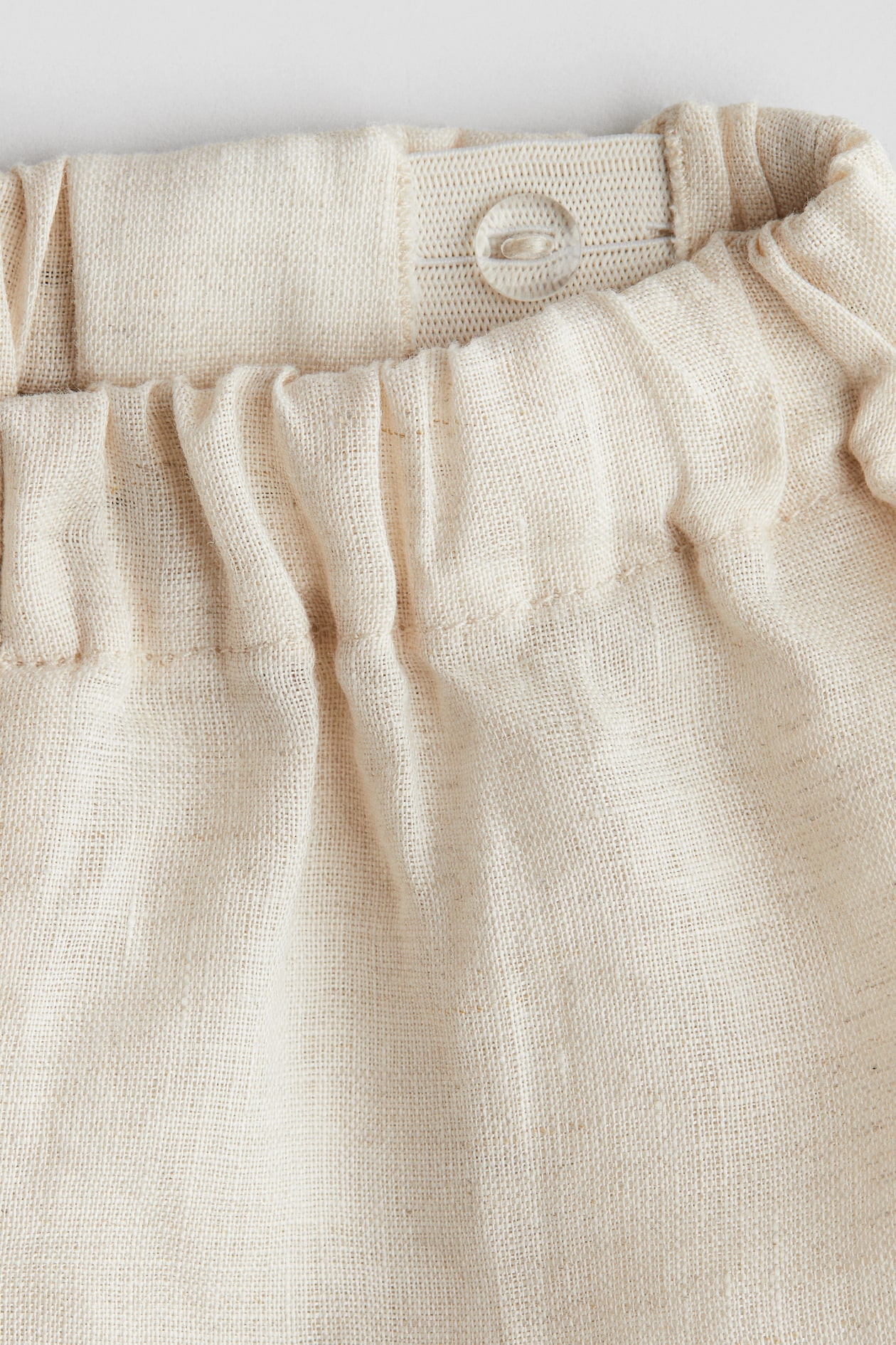 Light beige Frilled linen shorts for kids | H&M IN
