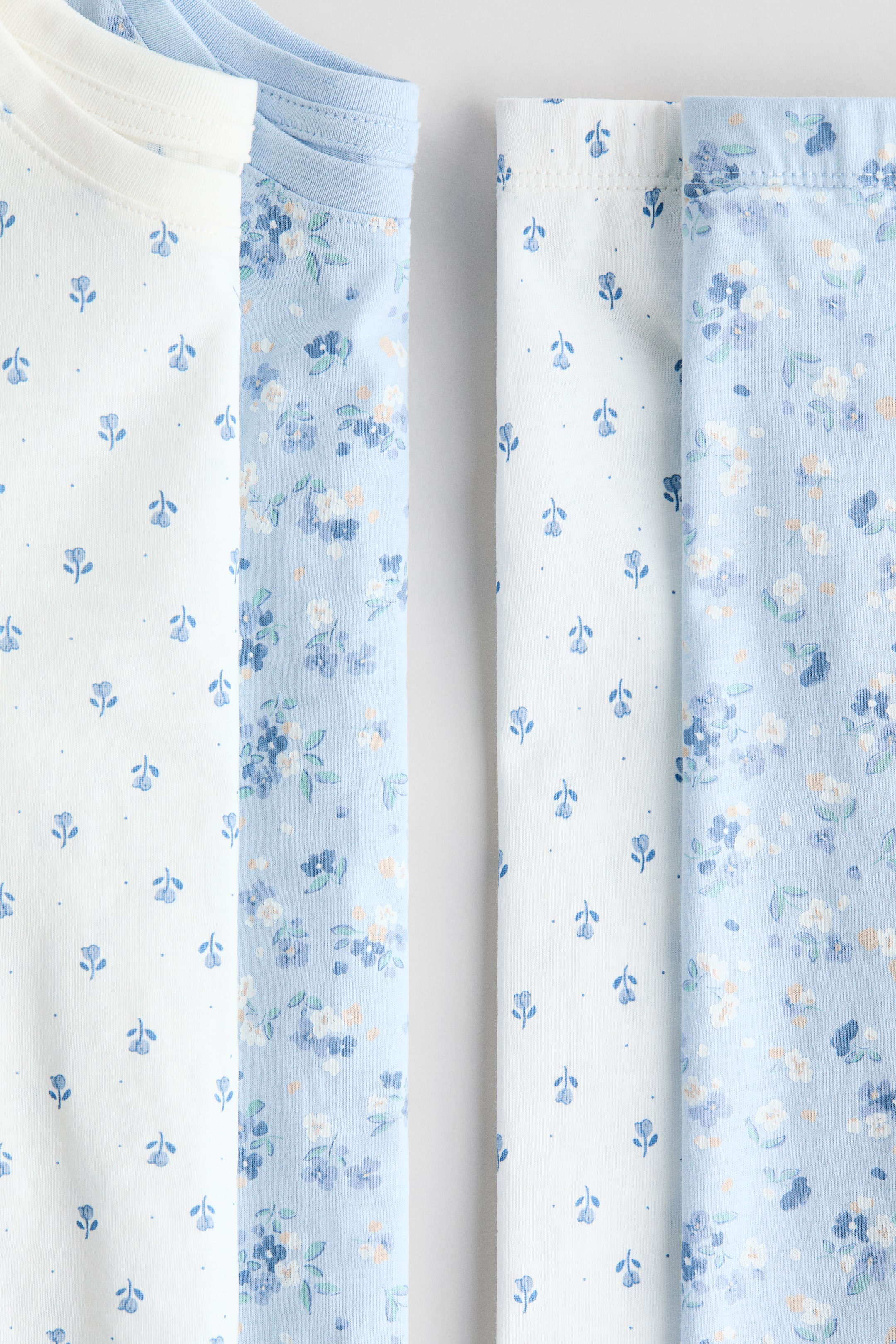 2 perechi de pijamale de jerseu - Albastru-deschis/flori - COPII | H&M RO