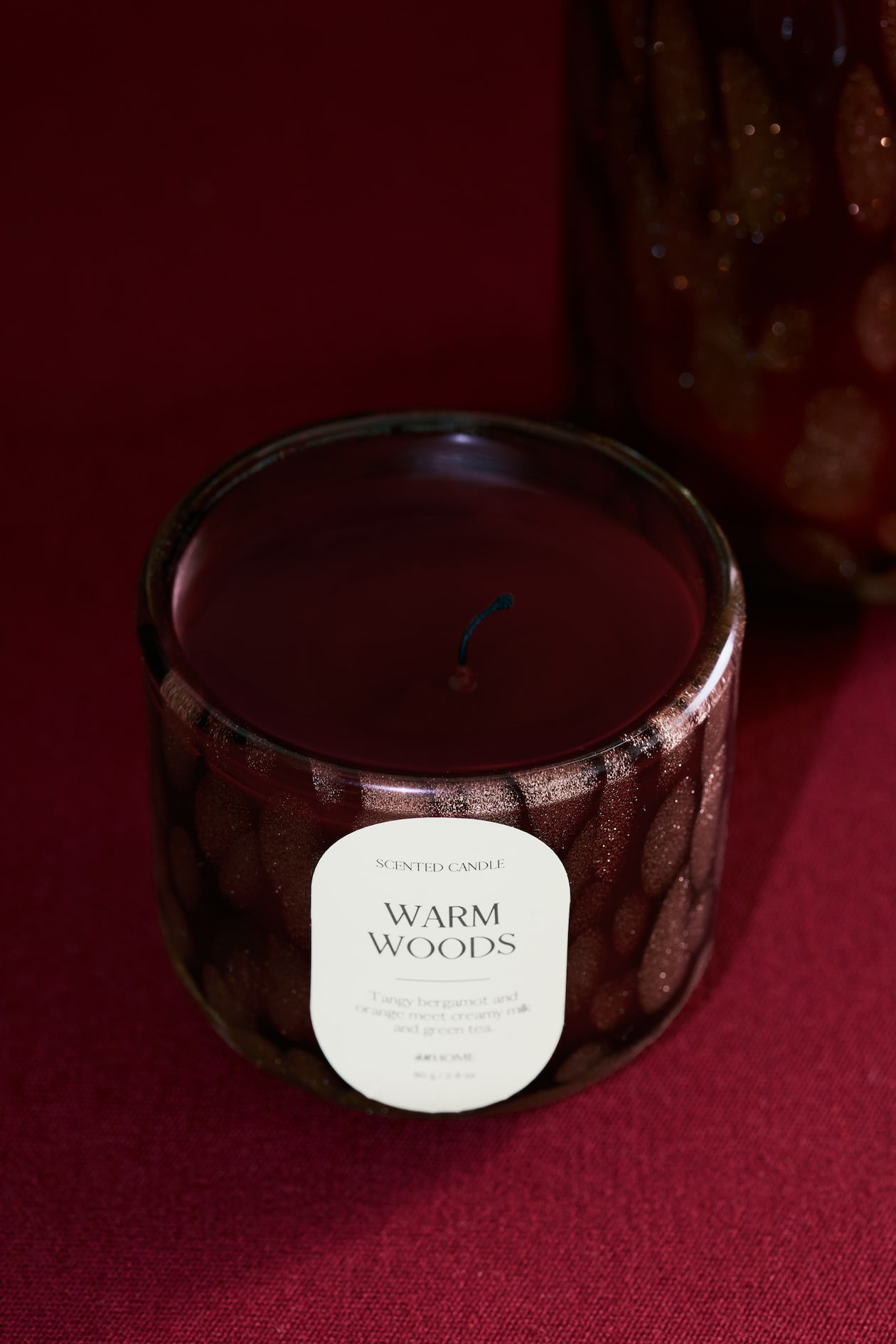 Warm Woods Scented Candle in Glass Holder at H&M Home | H&M US