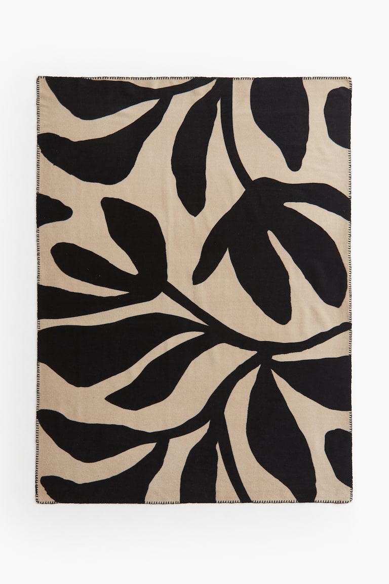 Beige/Patterned Patterned fleece blanket at H&M Home | H&M GB
