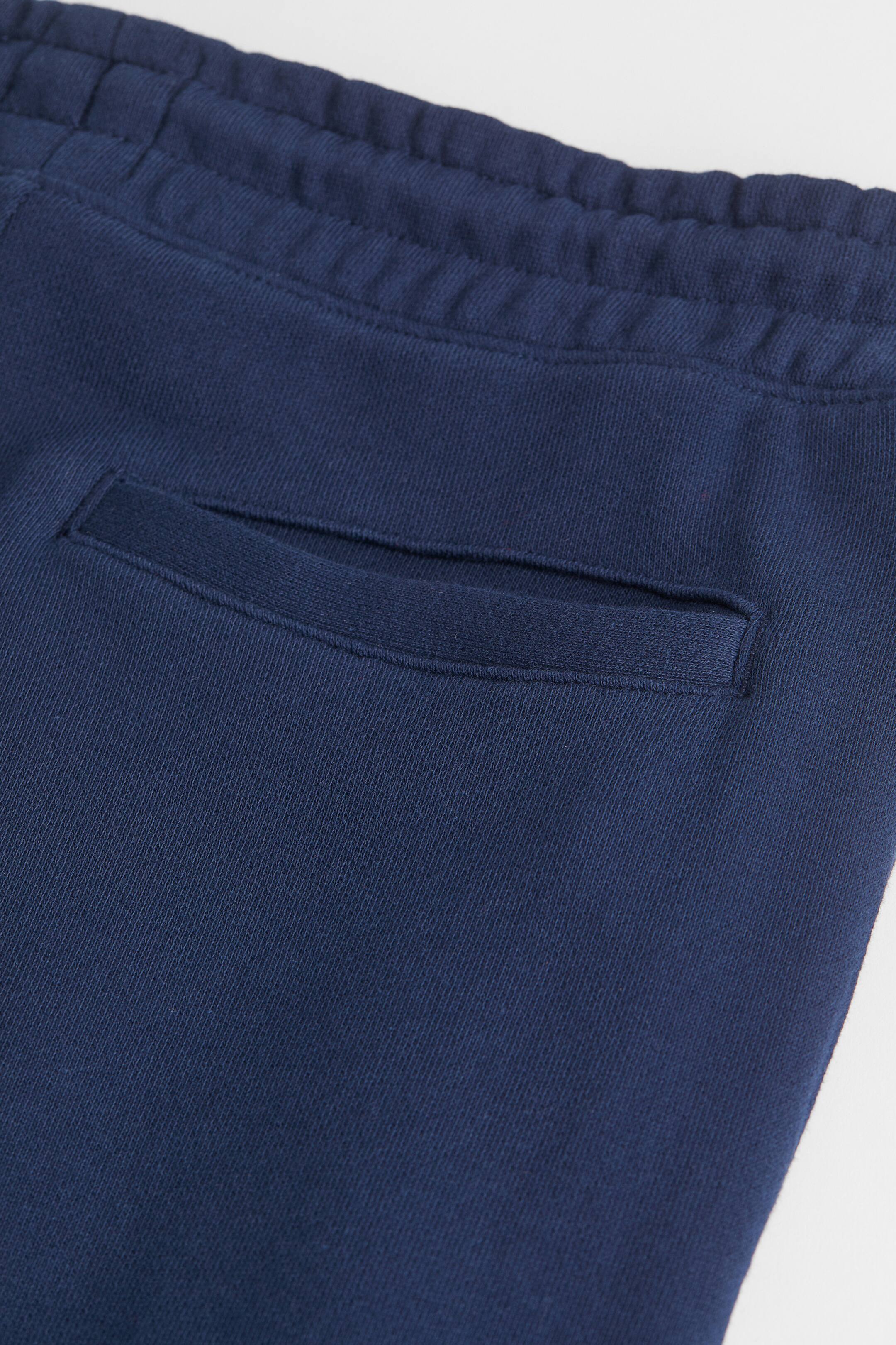 Regular Fit Sweatpants - Navy blue - Men | H&M IE
