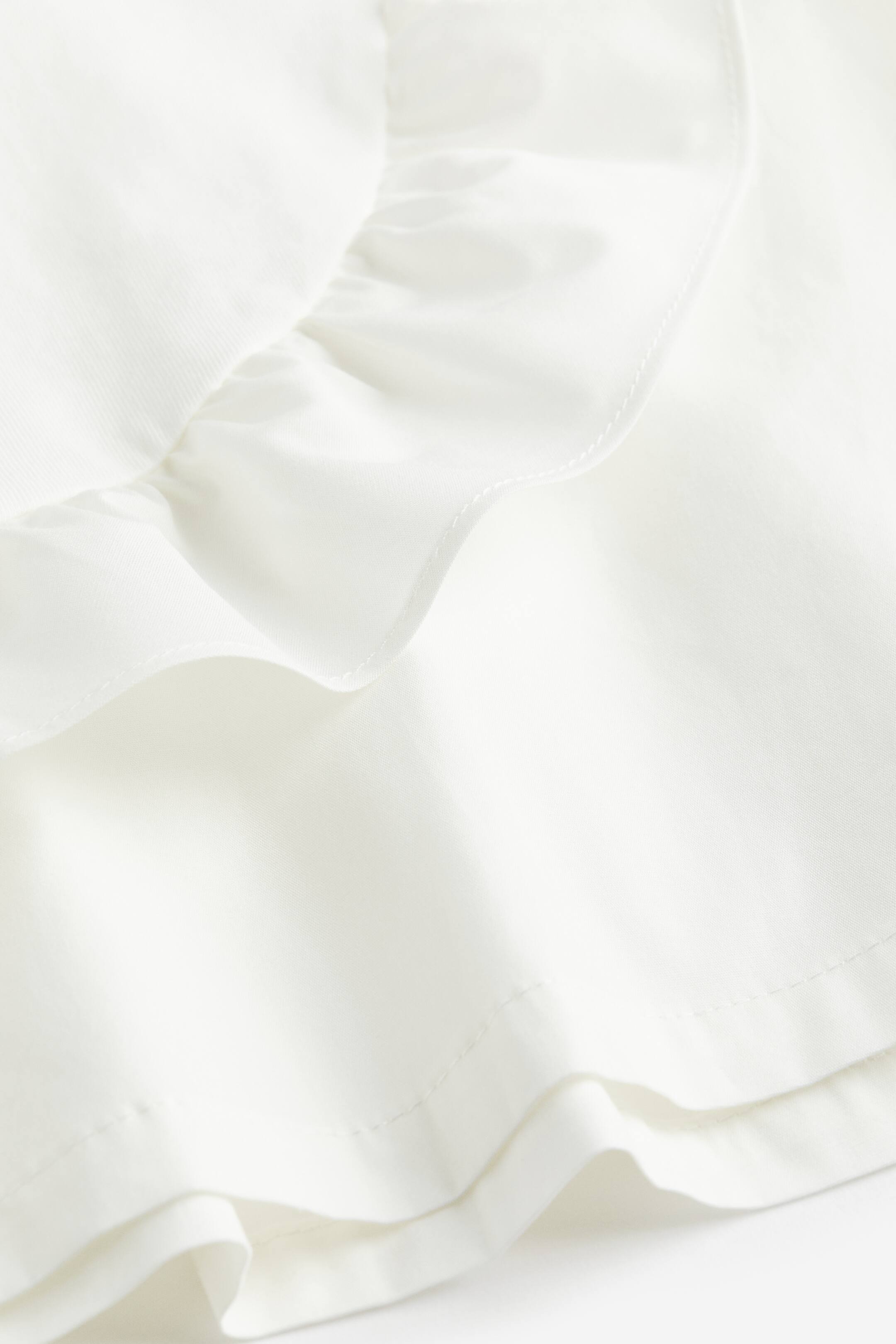 Top con olanes - Blanco - Kids | H&M MX