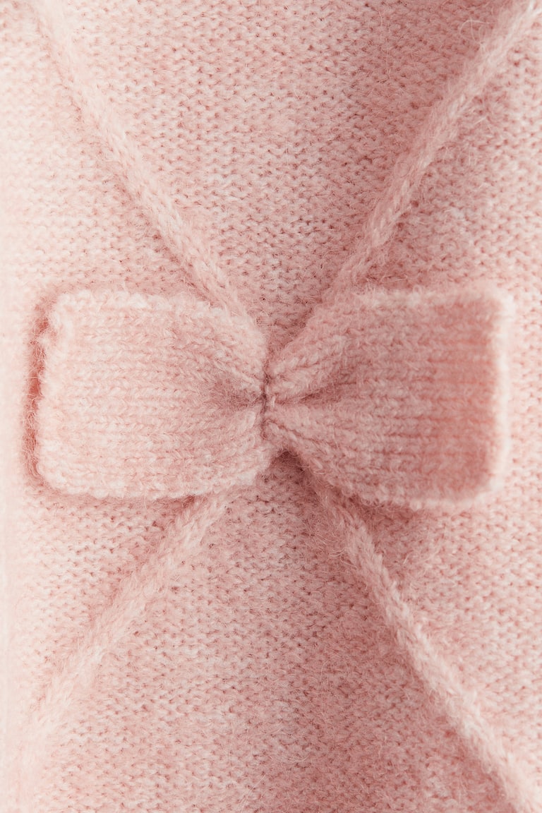 Suéter tejido con moños - Rosa claro - Kids | H&M MX