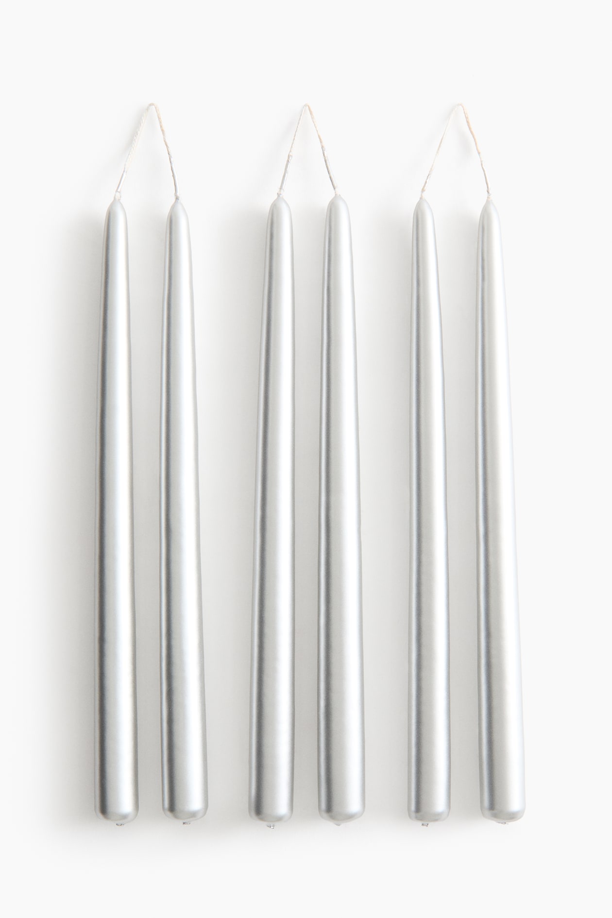 Silver-coloured 6-pack metallic tapered candles at H&M Home | H&M GB