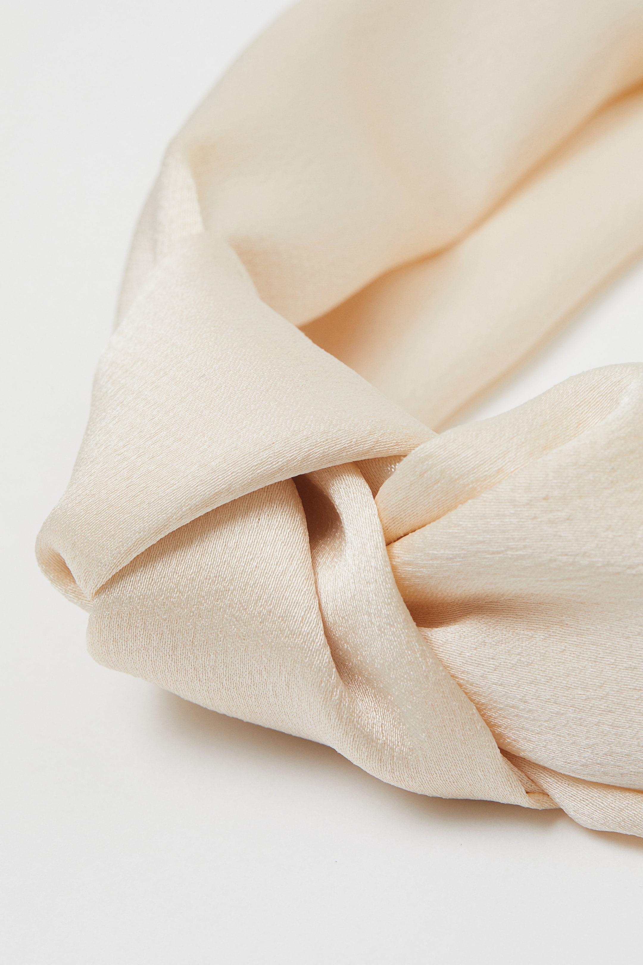 Alice band with a knot - Light beige - Ladies | H&M HK