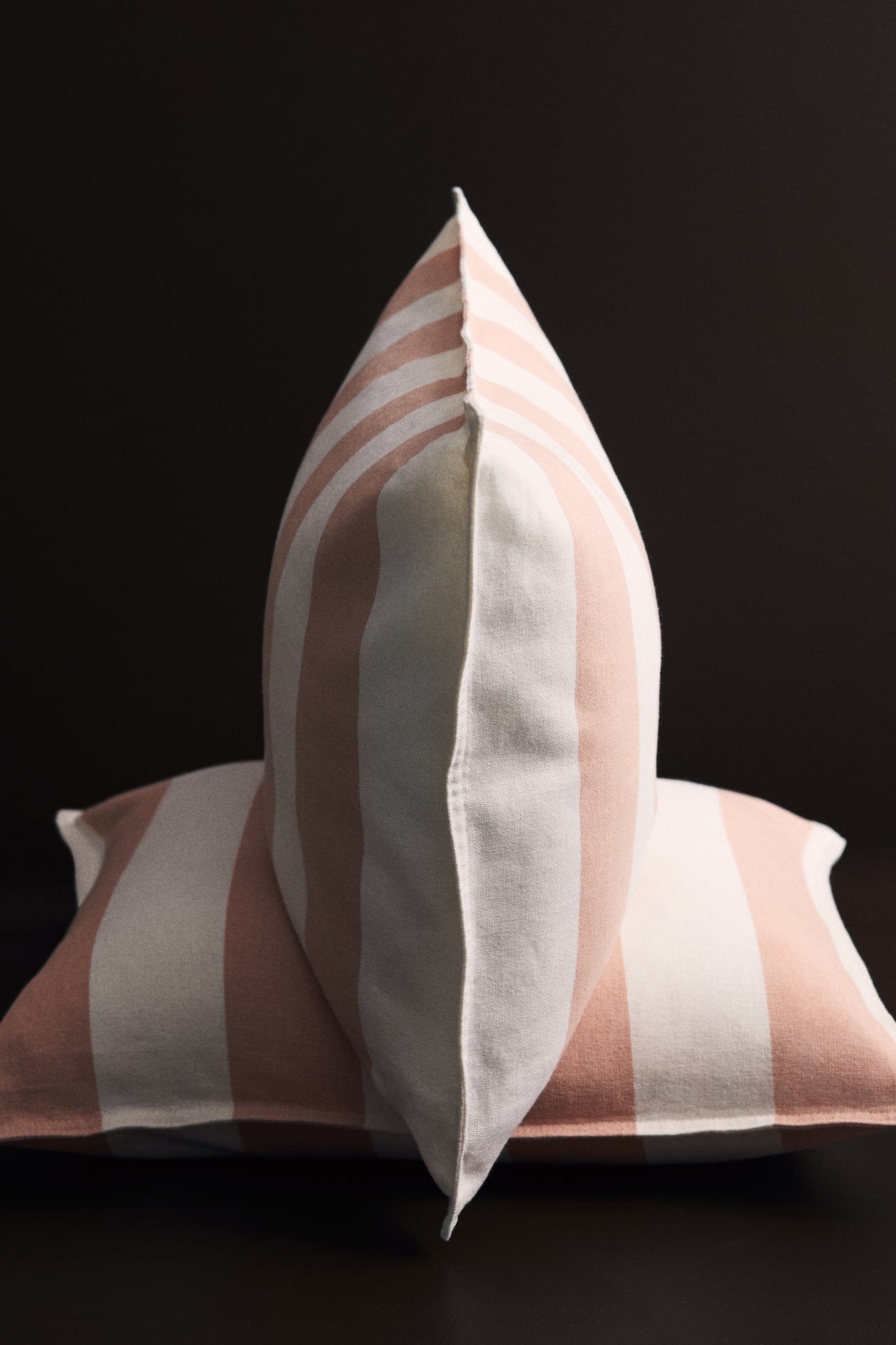 Light dusty pink/Striped Linen-blend cushion cover at H&M Home | H&M IN