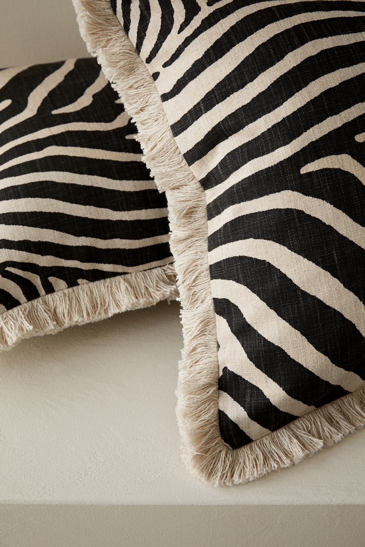 Light beige/Zebra print Fringed linen-blend cushion cover at H&M Home ...