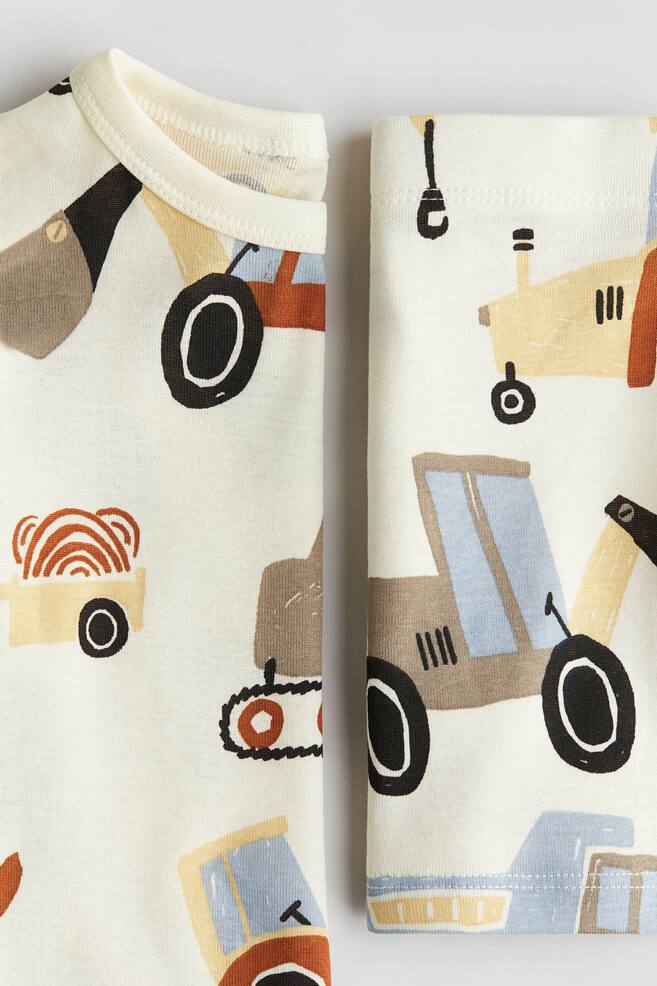 Snug Fit Cotton Jersey Pajamas - Light yellow/vehicles - Kids | H&M US