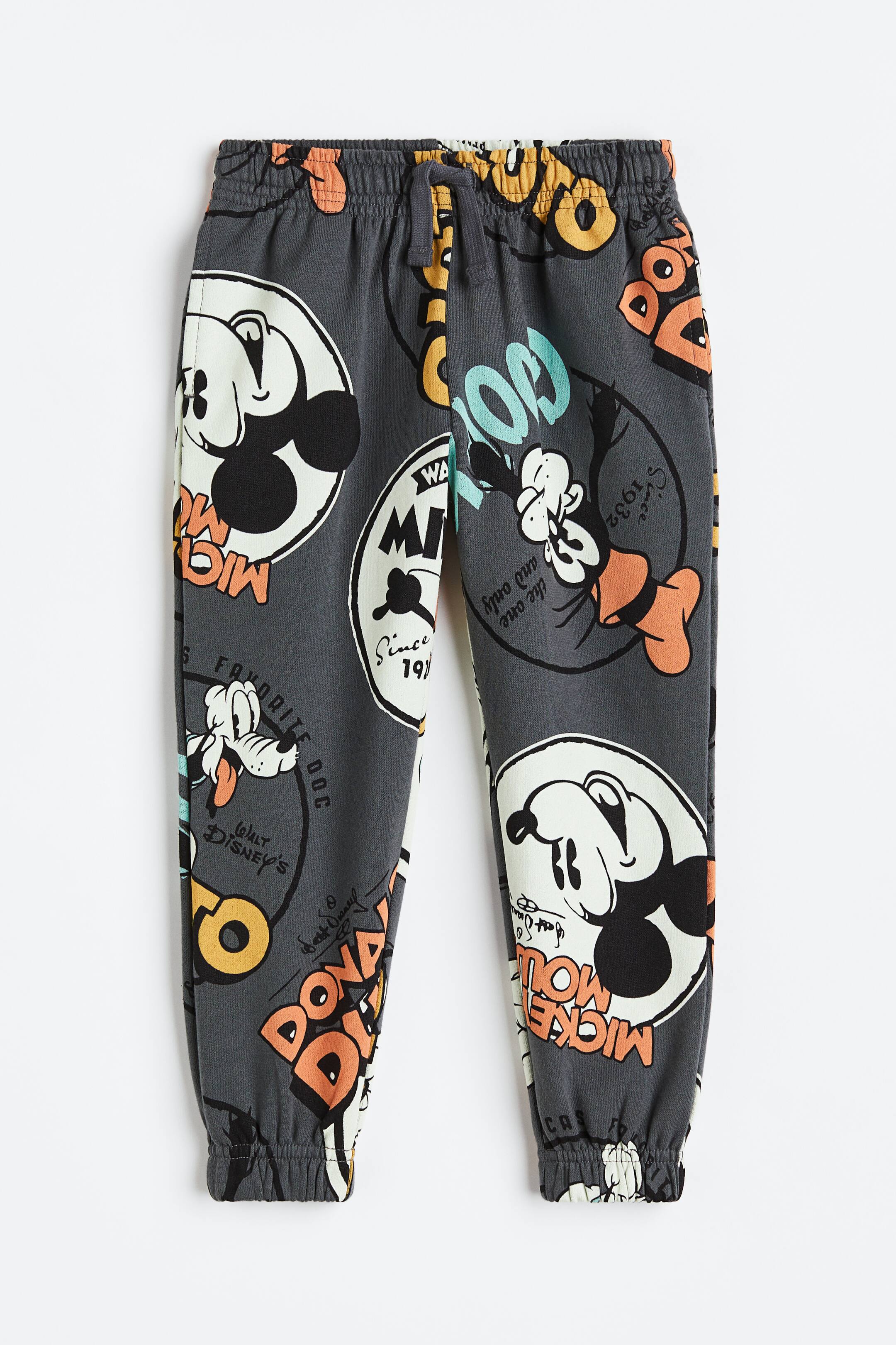 Patterned Joggers - Dark gray/Disney - Kids | H&M CA