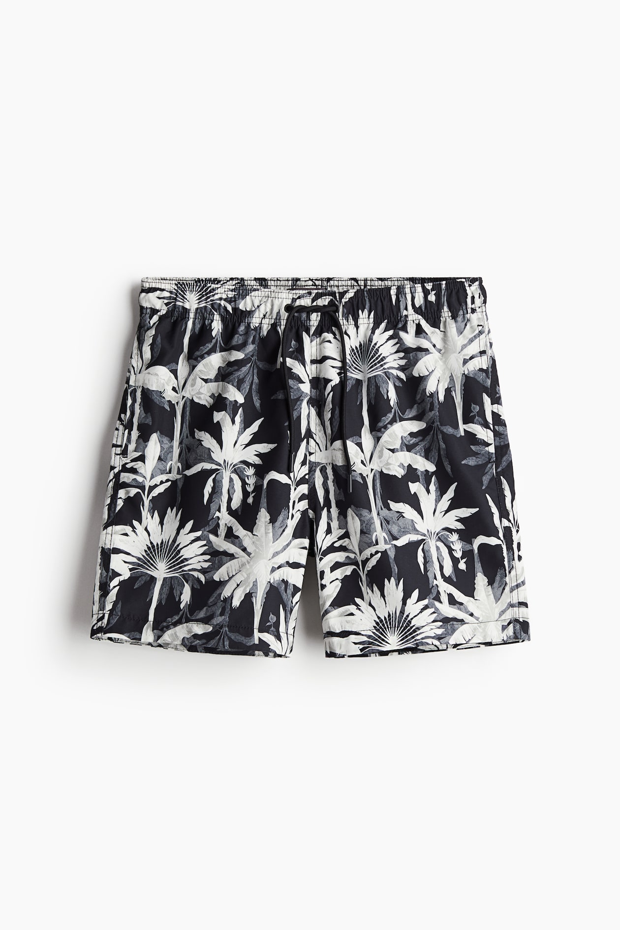 Men’s Black/Palm trees Patterned swim shorts | H&M IN