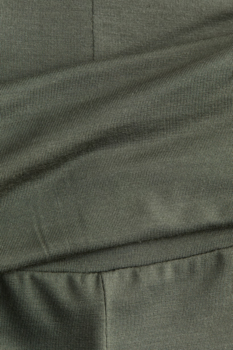 Flared jersey trousers - Dark khaki green - Ladies | H&M GB