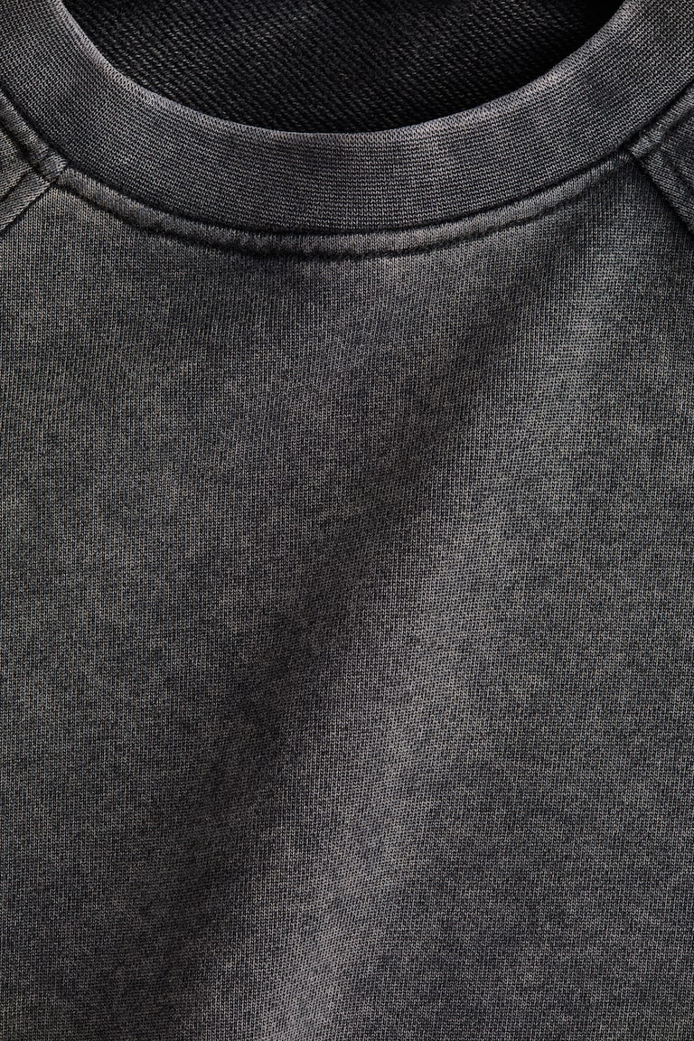 Women's Black/Washed out Washed-look sweatshirt | H&M IN