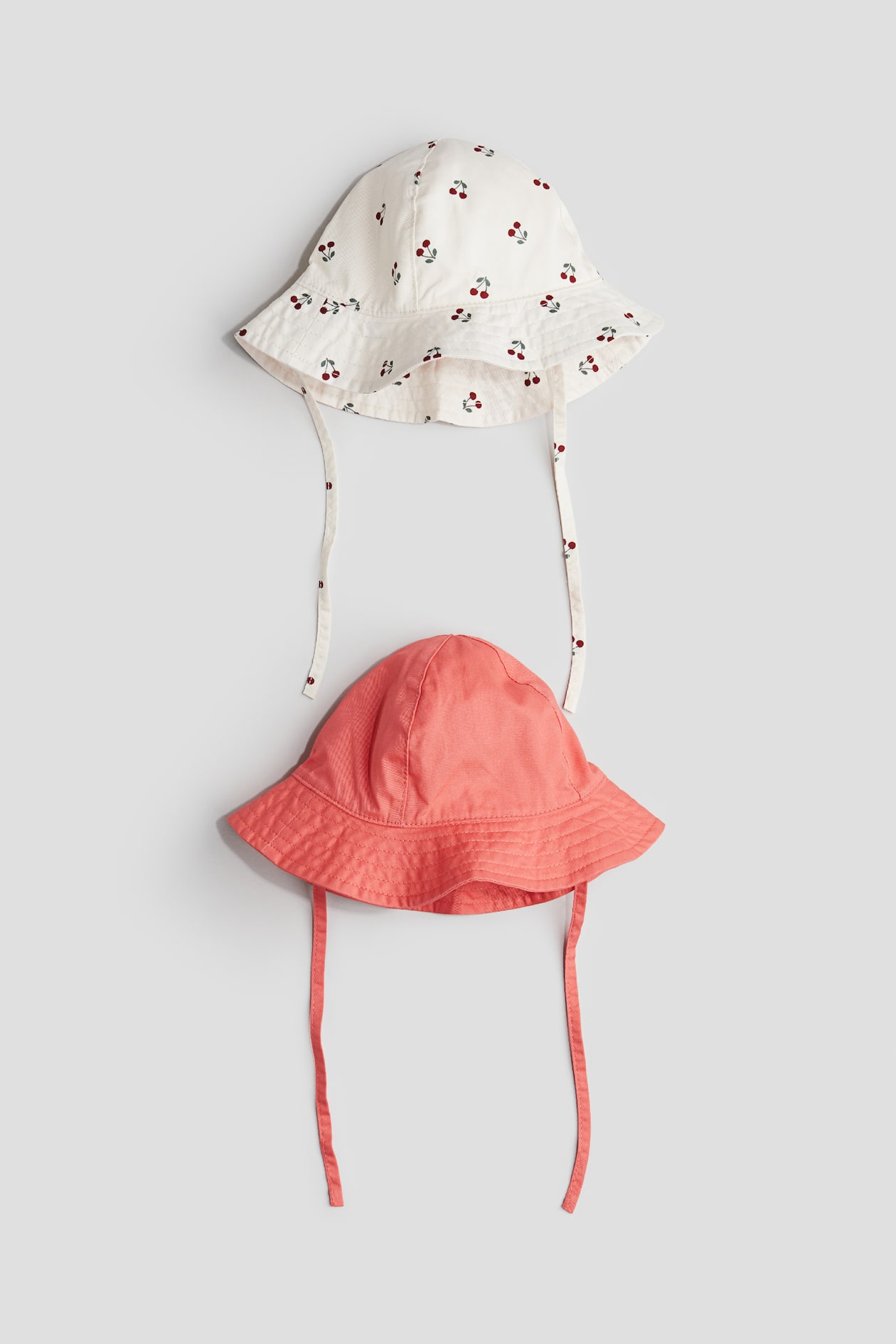 2-pack solhatt i bomull - Vit/Körsbär - BARN | H&M SE
