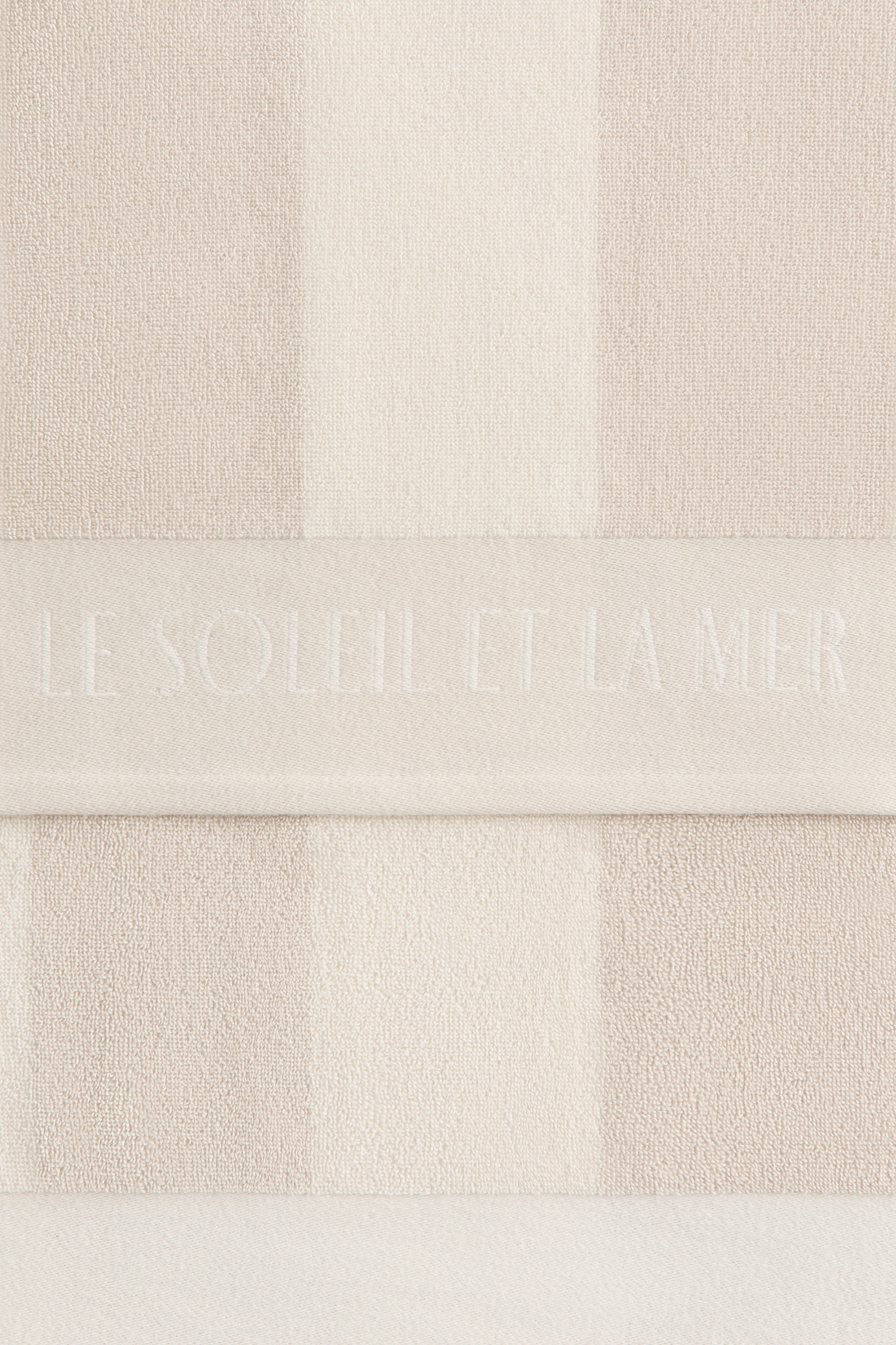 Light beige/Striped Striped cotton beach towel at H&M Home | H&M IN