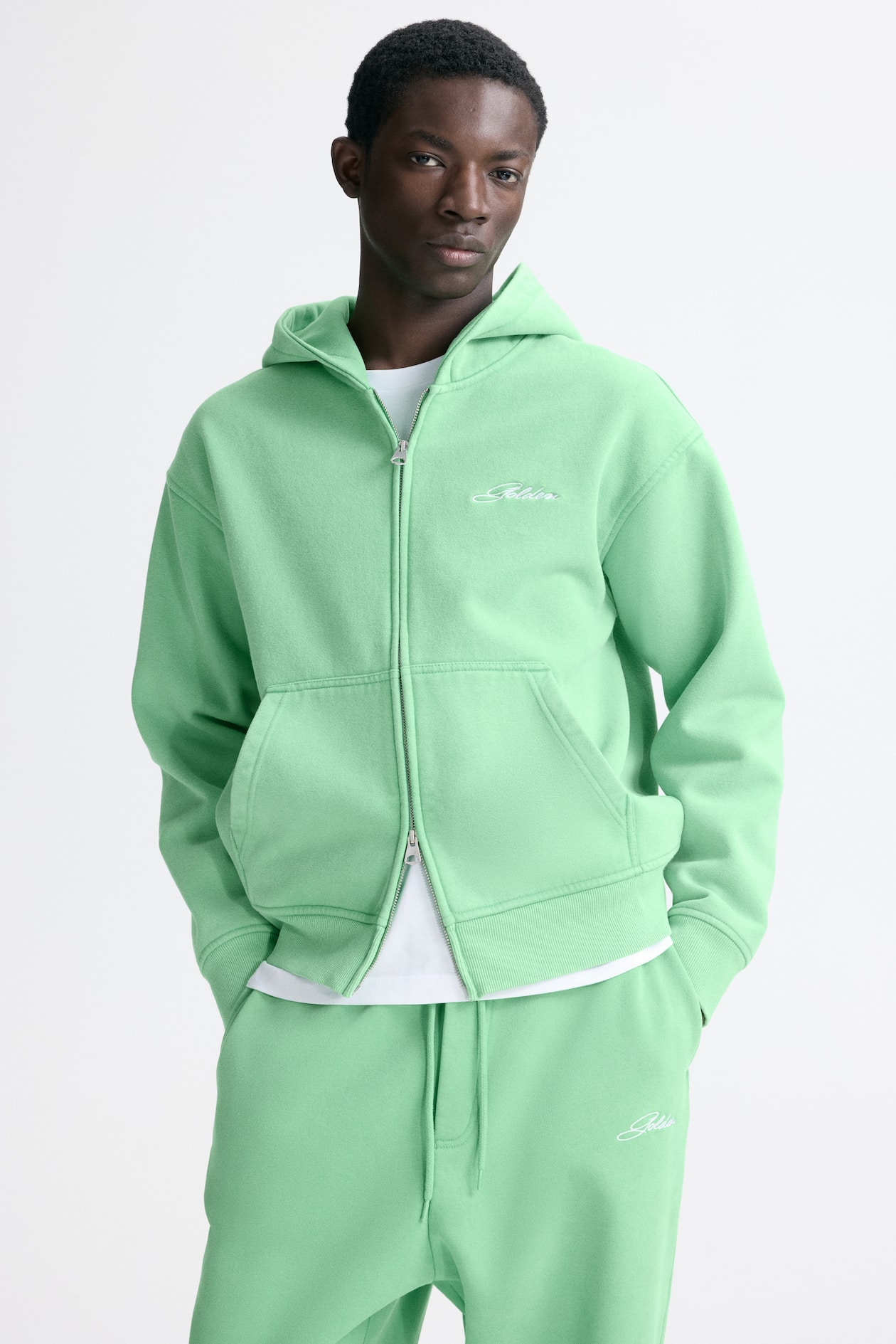 Loose Fit Boxy zip-through hoodie - Bright green/Golden - Men | H&M IE