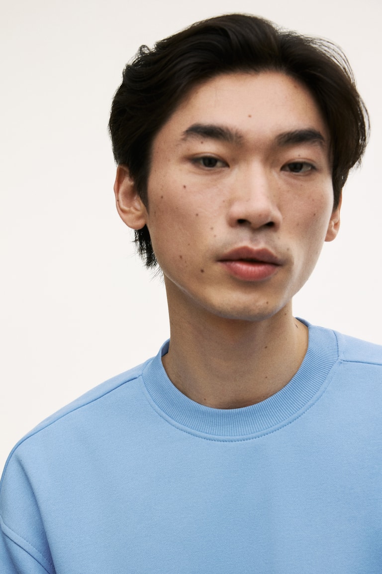 Men’s Light blue Loose-Fit Sweatshirt | H&M US