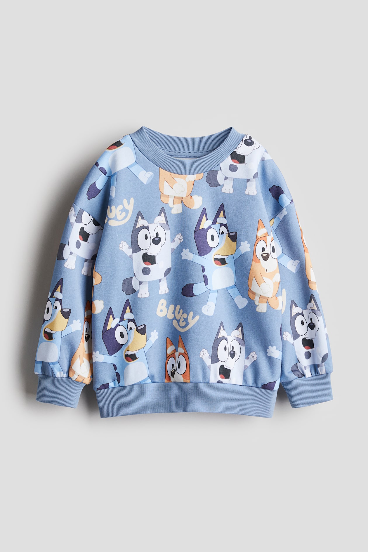 Oversized sweater met print - Blauw/Bluey - KINDEREN | H&M BE