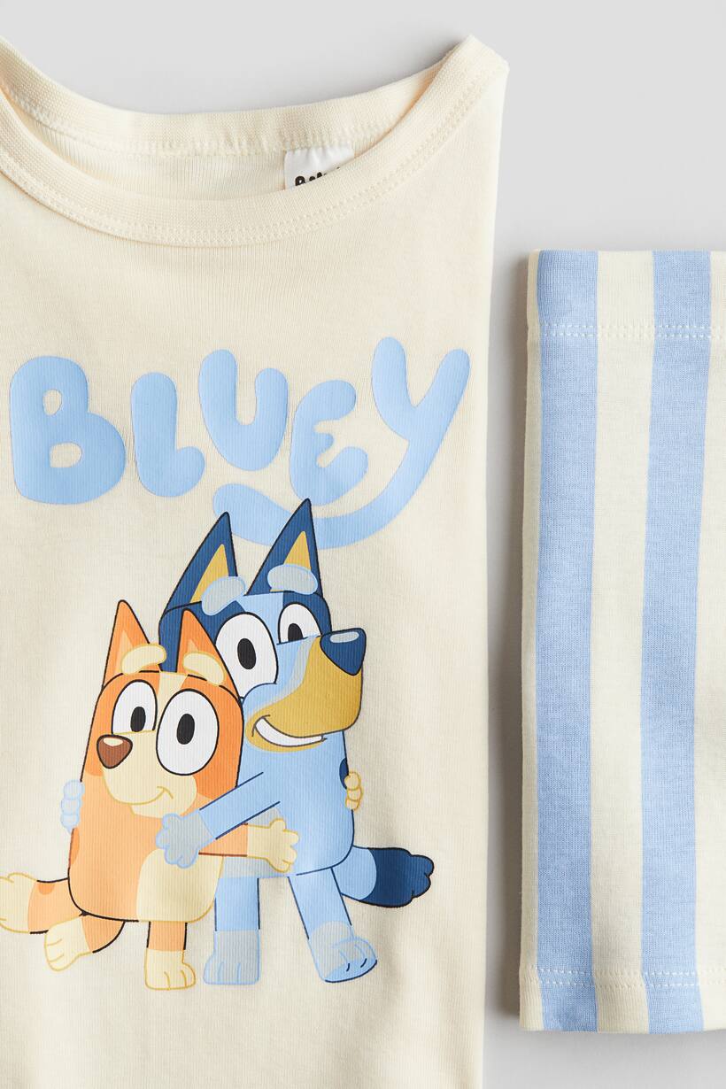 Snug Fit Cotton Jersey Pajamas - Light yellow/Bluey - Kids | H&M US