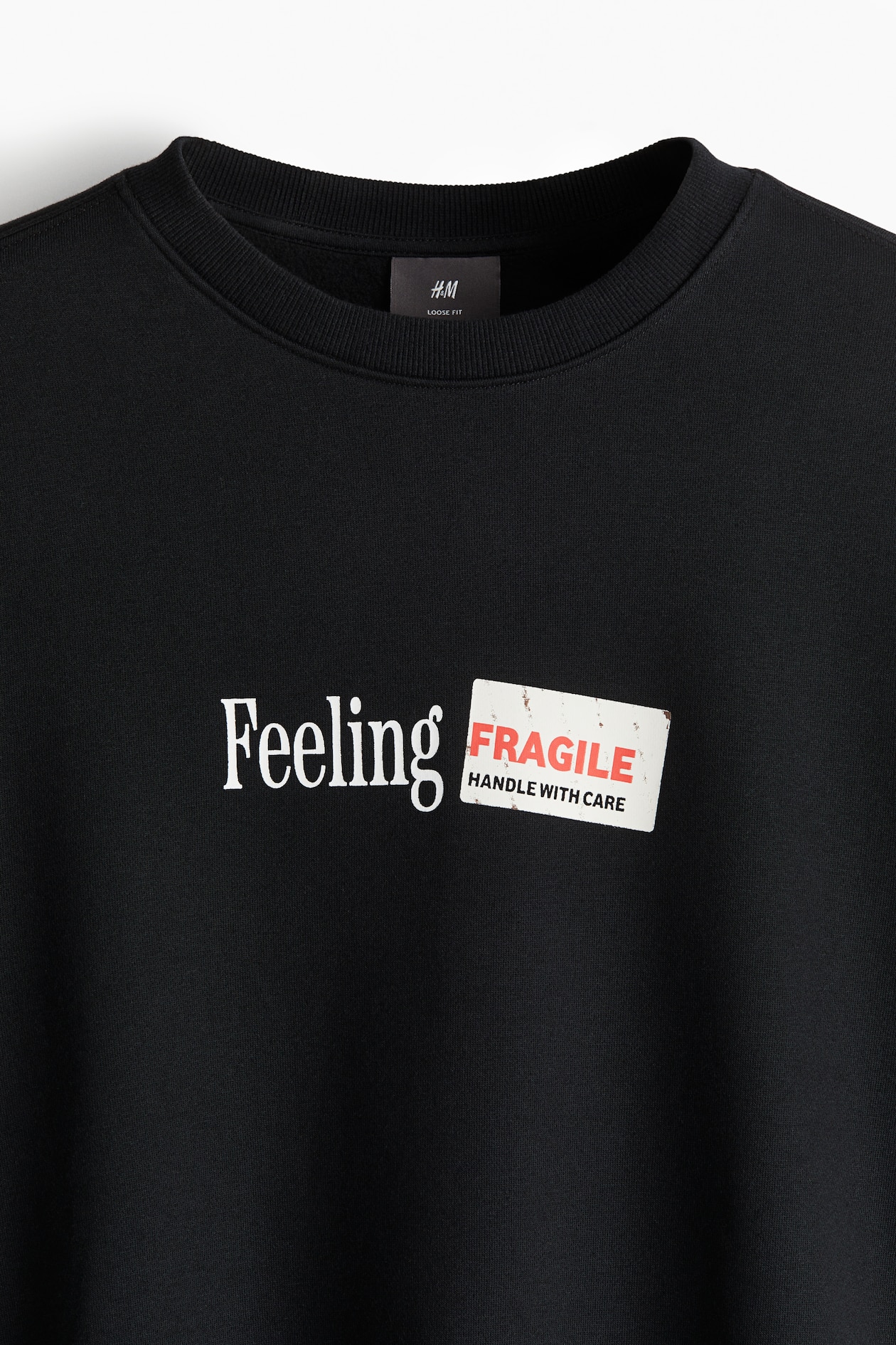 Men’s Black/Feeling Fragile Loose Fit Printed Sweatshirt | H&M CA