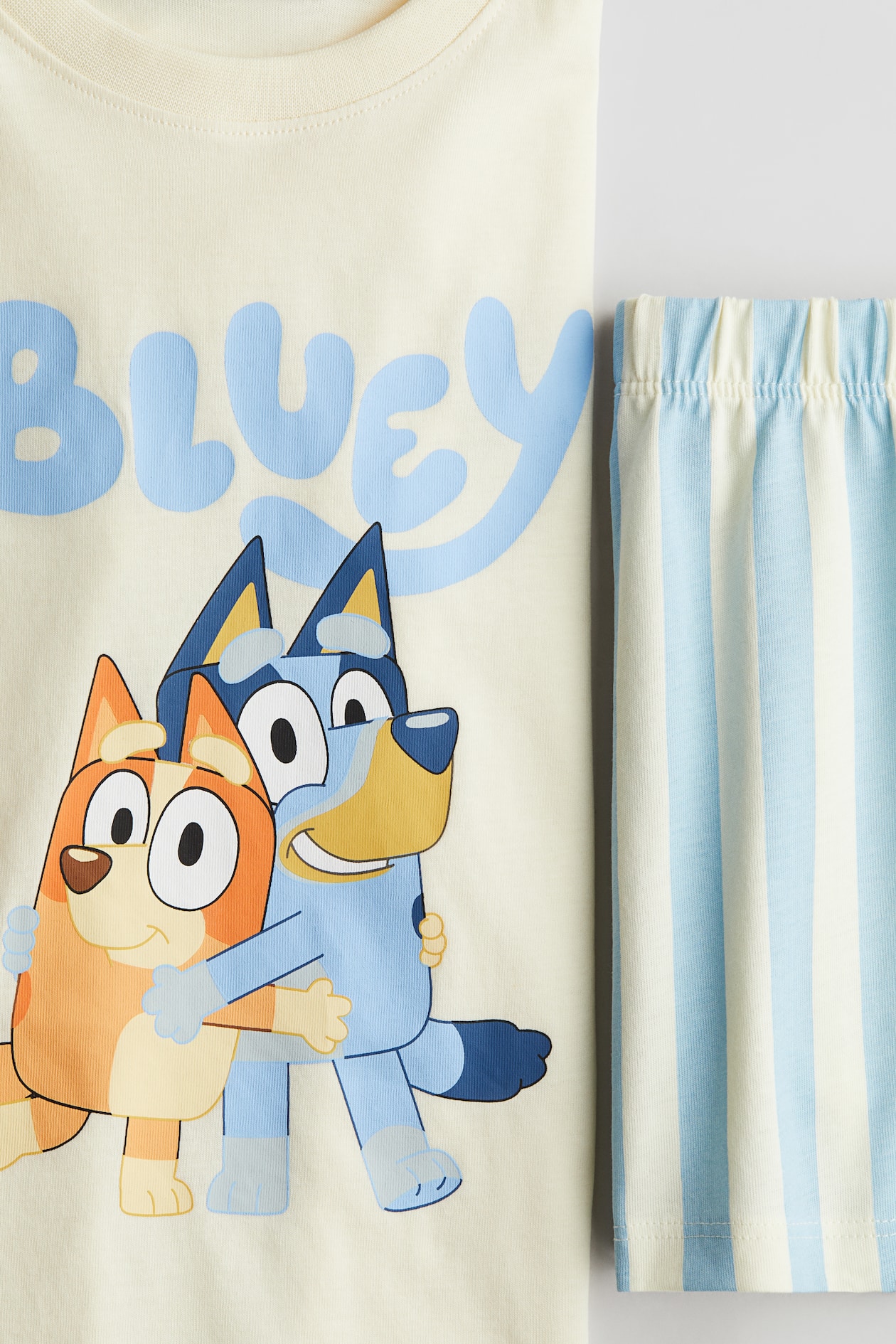 Pyjama van katoenen tricot met print - Lichtgeel/Bluey - KINDEREN | H&M NL