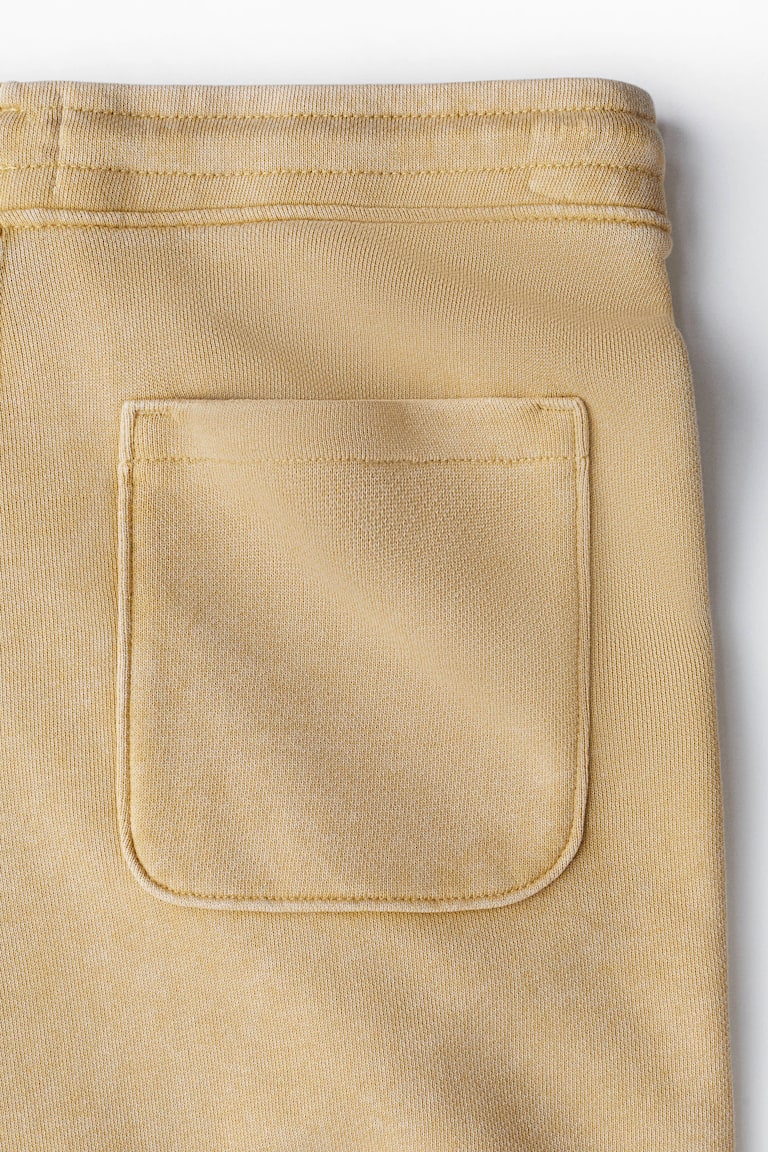 Regular Fit Sweatshorts - Yellow - Men | H&M GB