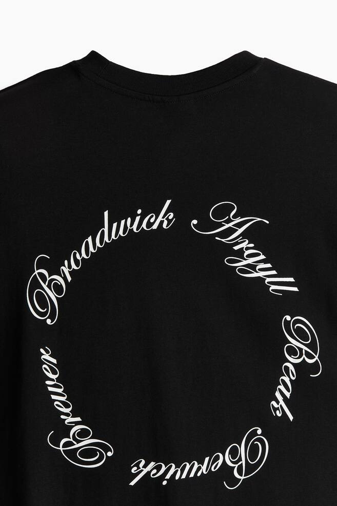 Men’s Black/Soho Heights Loose Fit Printed T-shirt | H&M CA