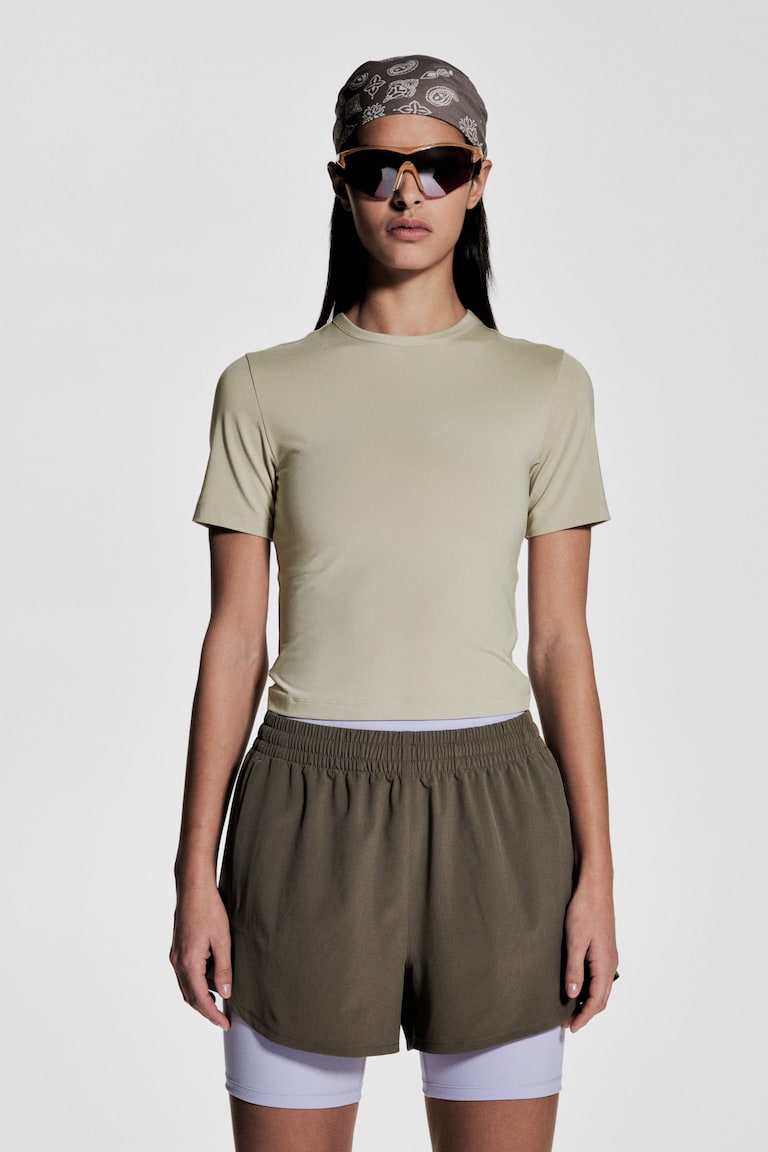 Sports Crop Top with DryMove™ - Light beige - Ladies | H&M US