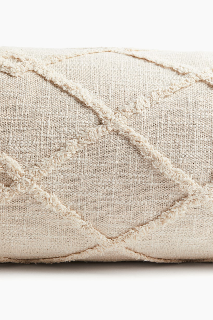 Light beige Tufted Cotton Bolster at H&M Home | H&M US