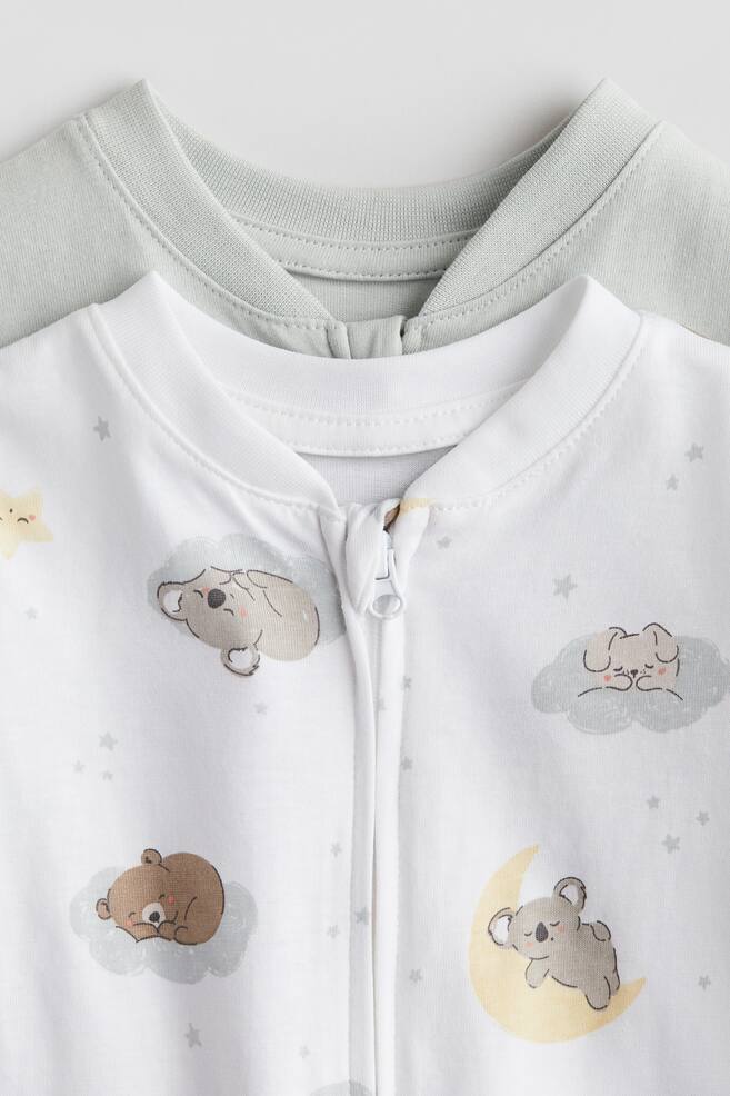 Light dusty green/Patterned 2-pack zip-up sleepsuits for kids | H&M MY