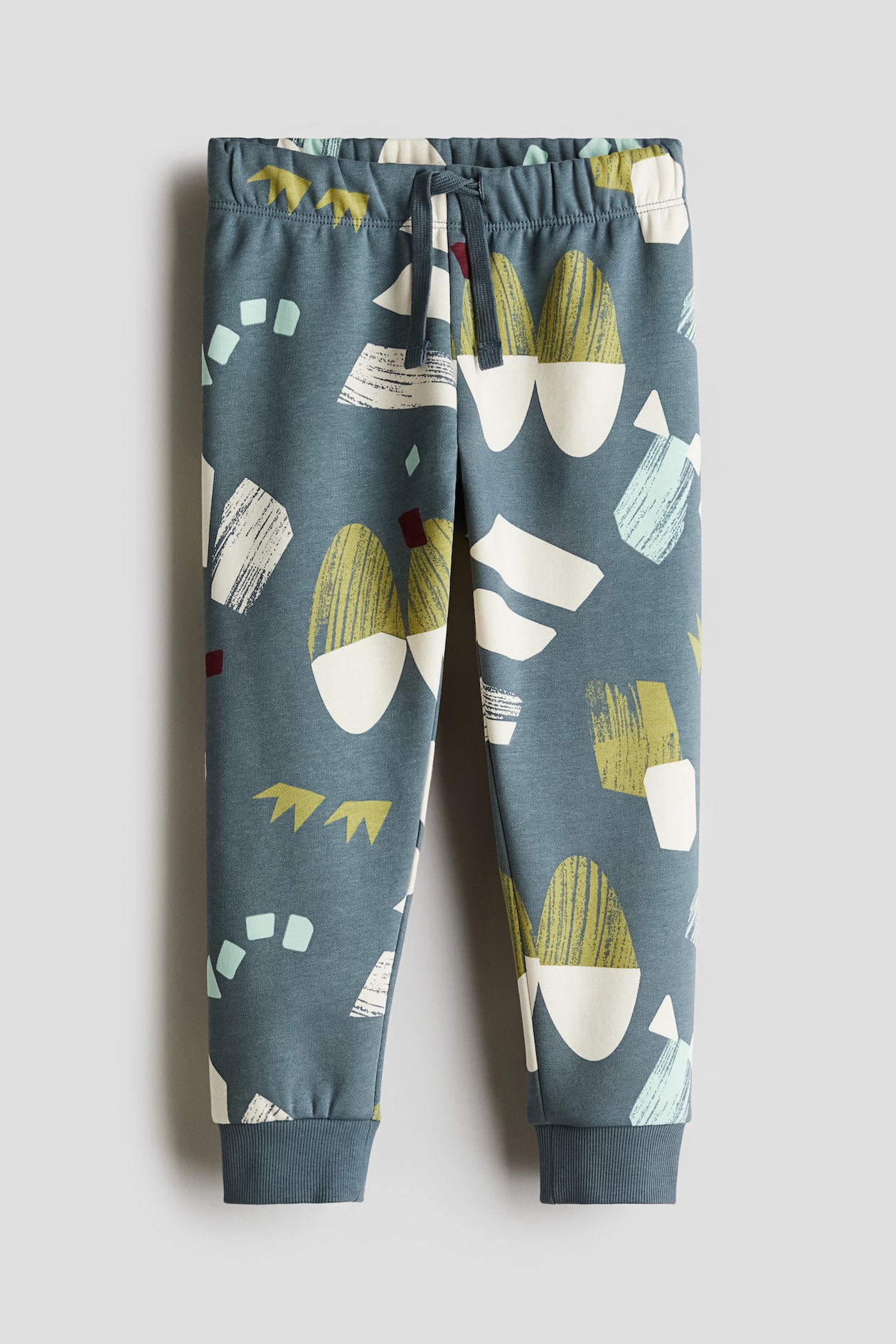 Dark turquoise/patterned Printed Joggers for kids | H&M US