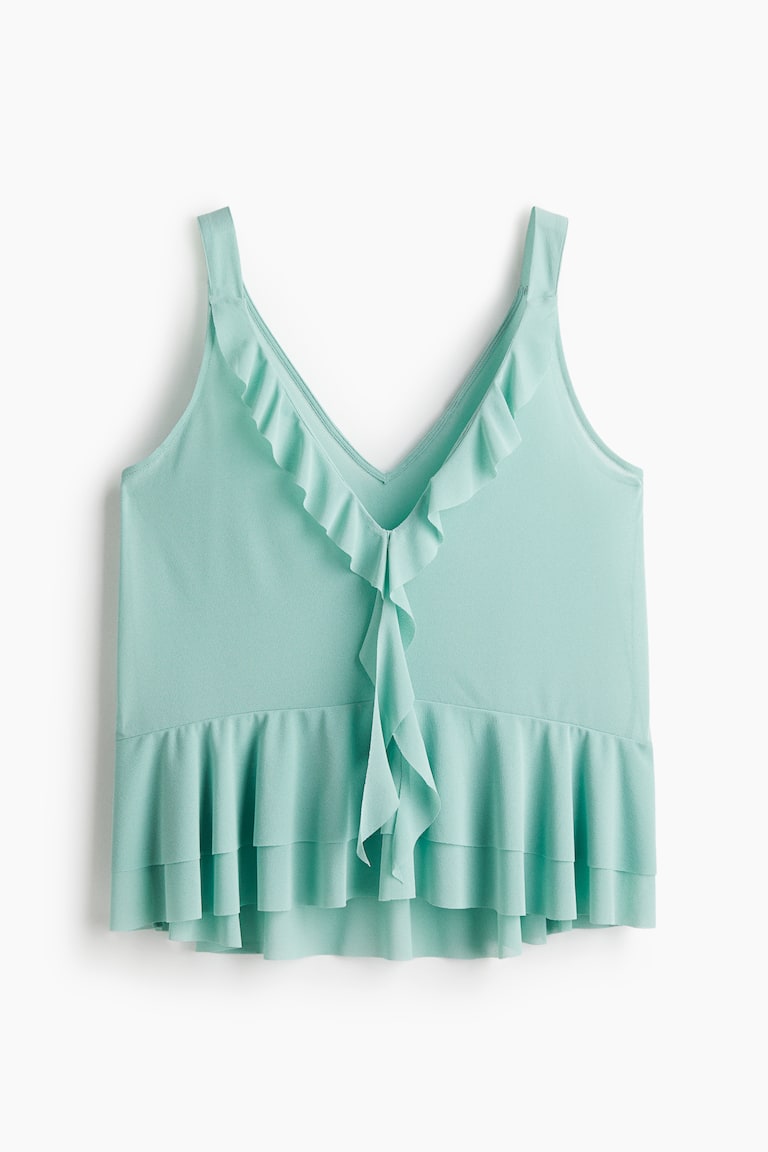 Top sin mangas con olanes - Turquesa claro - Ladies | H&M MX
