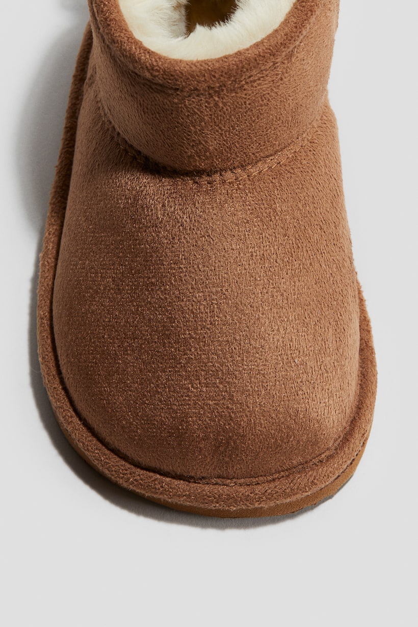 Botas con forro en pelo sintético - Café claro - Kids | H&M MX