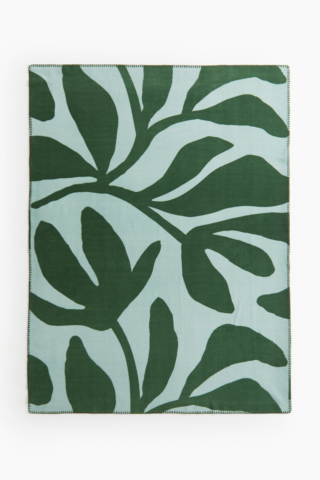 Turquoise/patterned Patterned Fleece Throw at H&M Home | H&M US