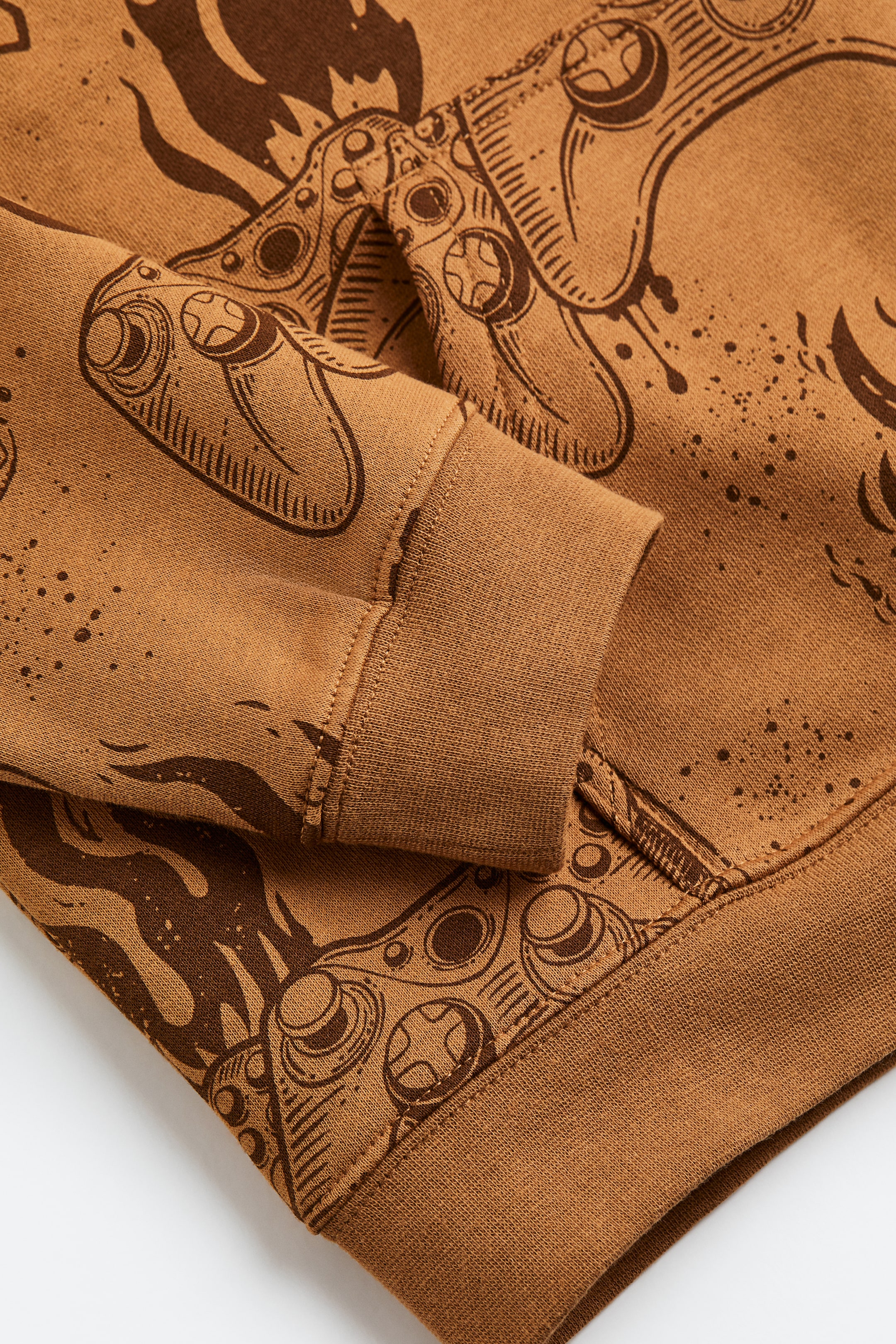 Oversized printed hoodie - Brown/Game Controllers - Kids | H&M GB