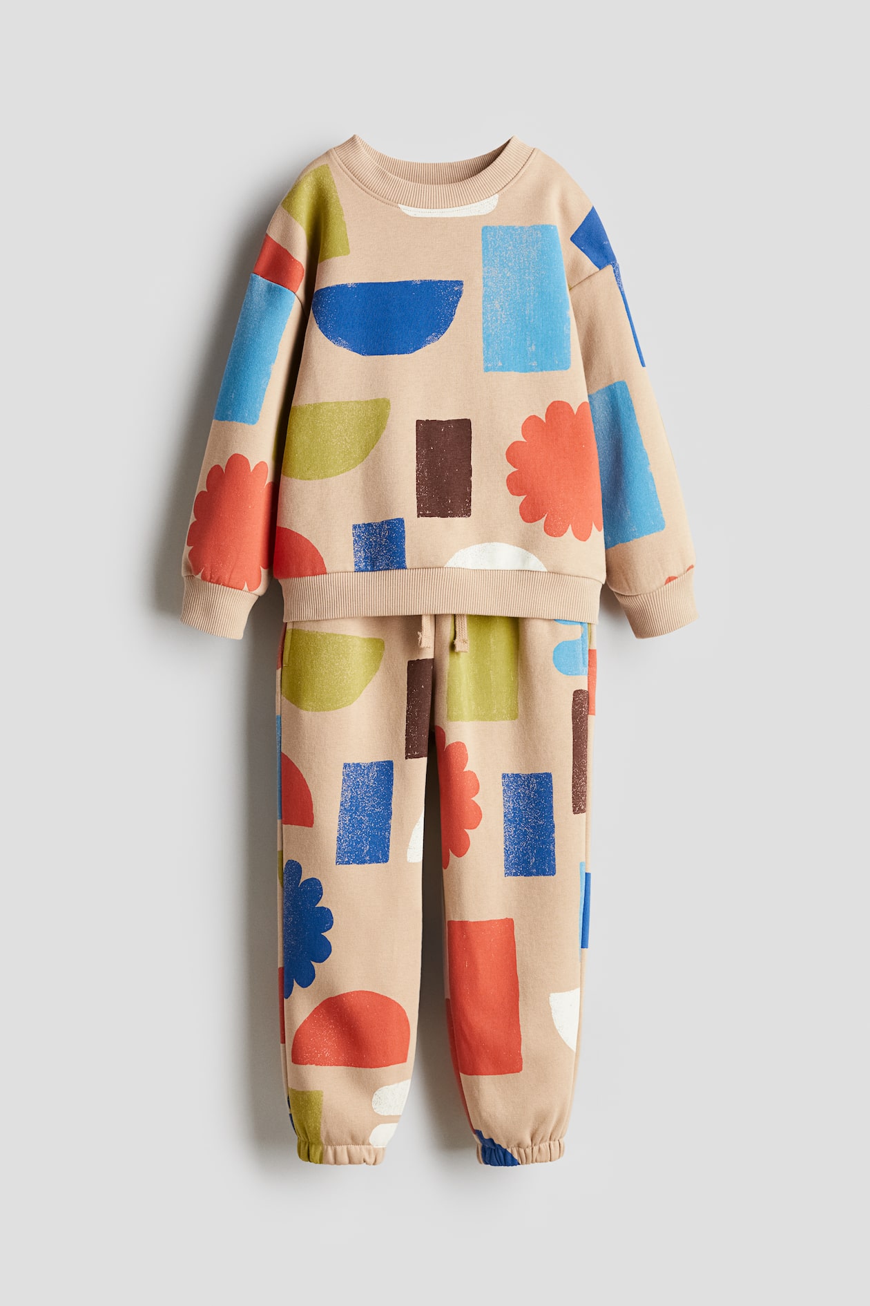Conjunto de sudadera y joggers estampados - Beige/Estampado - NIÑOS | H&M ES