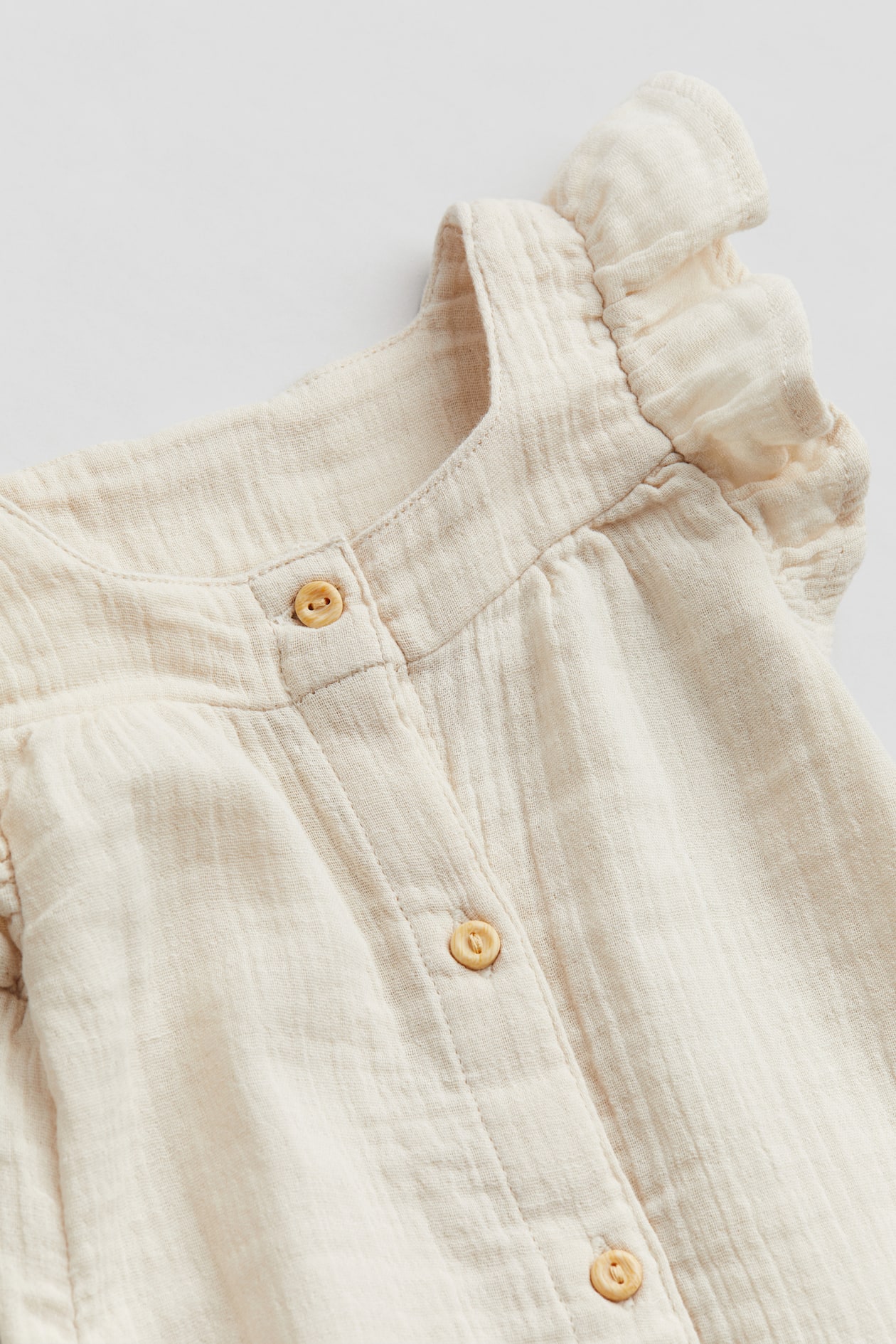 Ruffle-trimmed Muslin Romper Suit - Light beige - Kids | H&M US