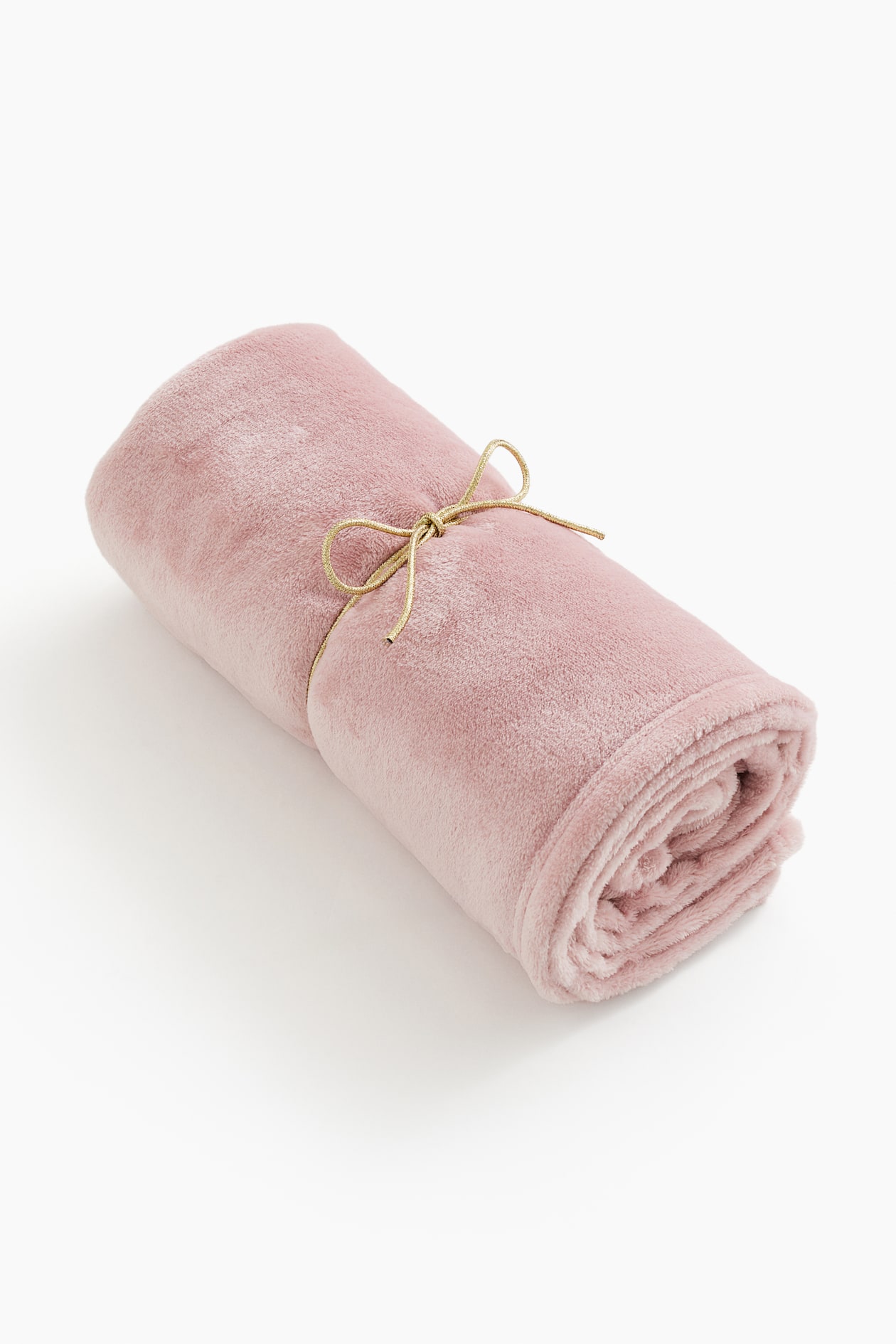 Light pink Fleece blanket at H&M Home | H&M GB
