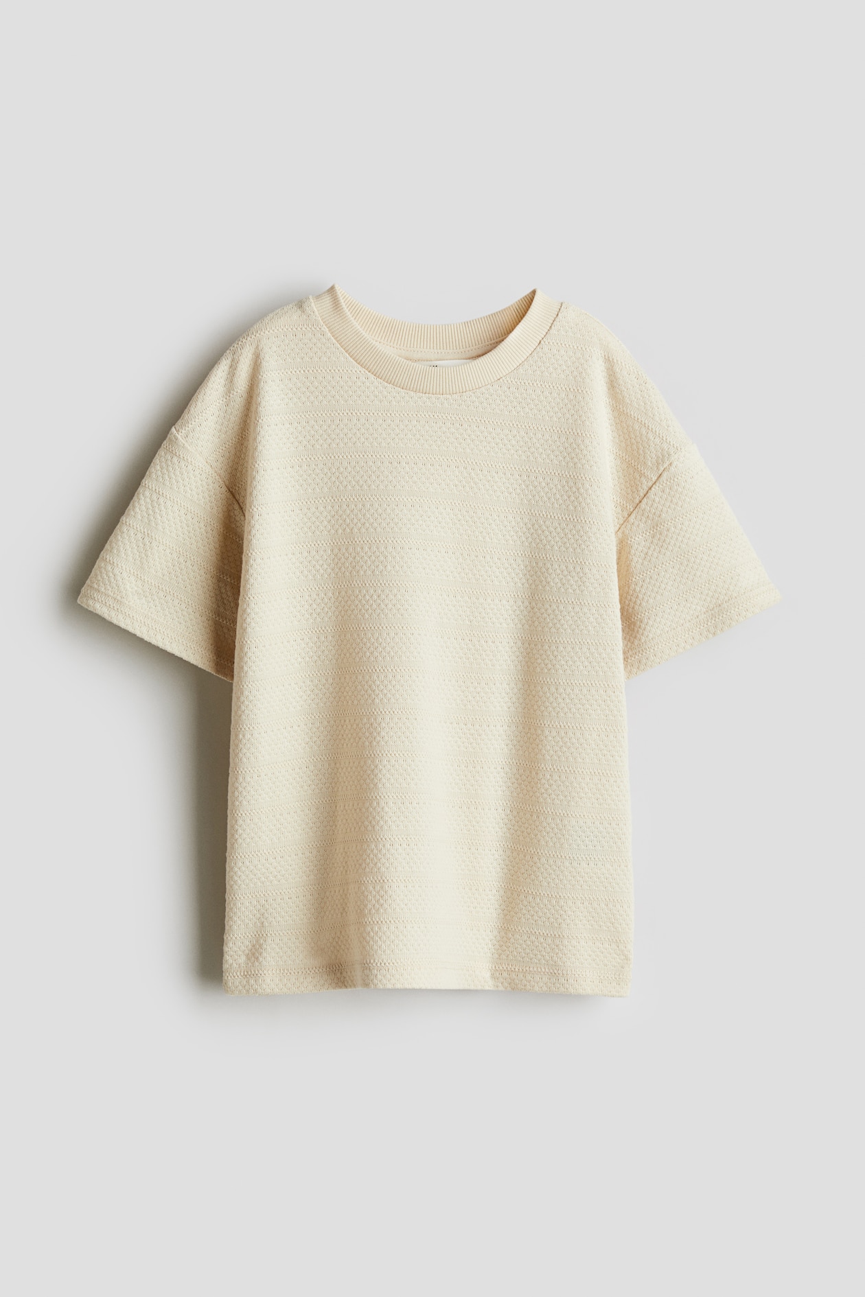 Playera en tejido texturizado - Beige claro - Kids | H&M MX