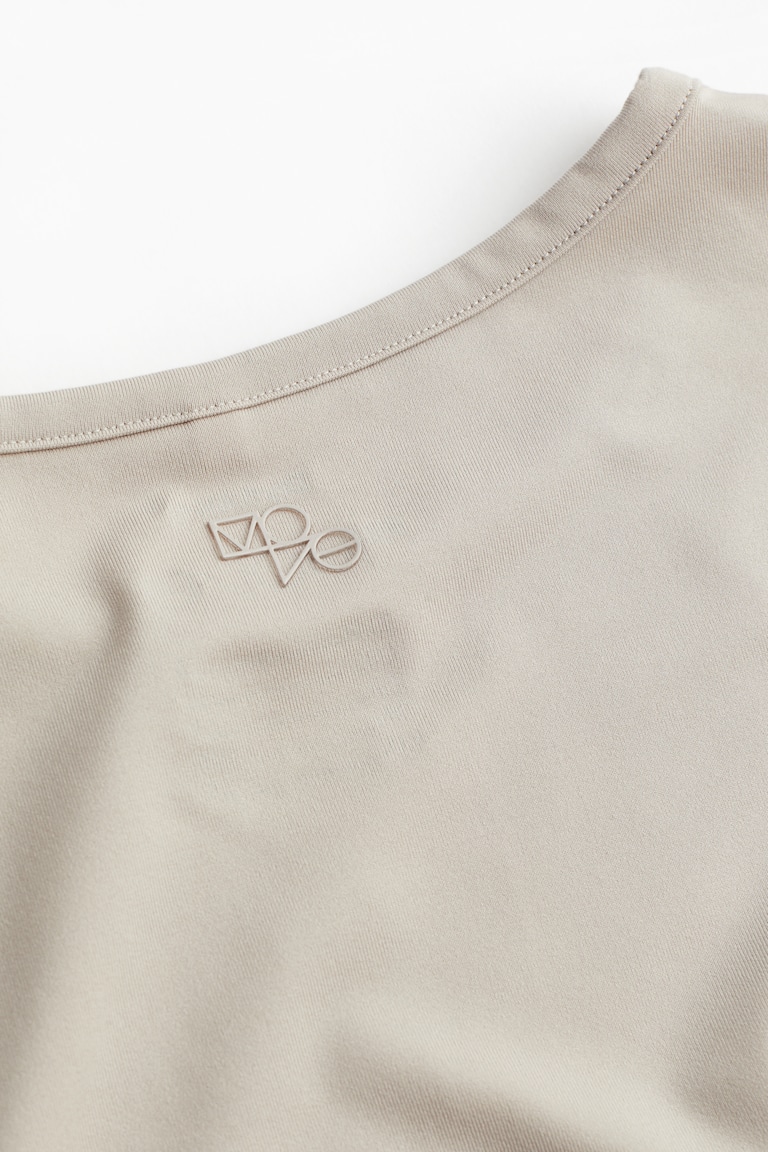 Women's Beige Sports top with DryMove™ | H&M GB