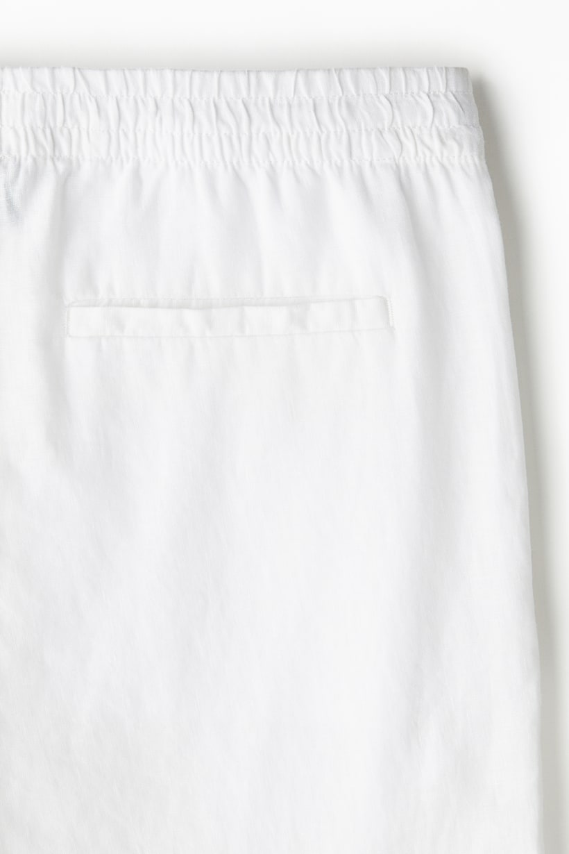 Pantalón Regular Fit en lino - Blanco - Men | H&M MX
